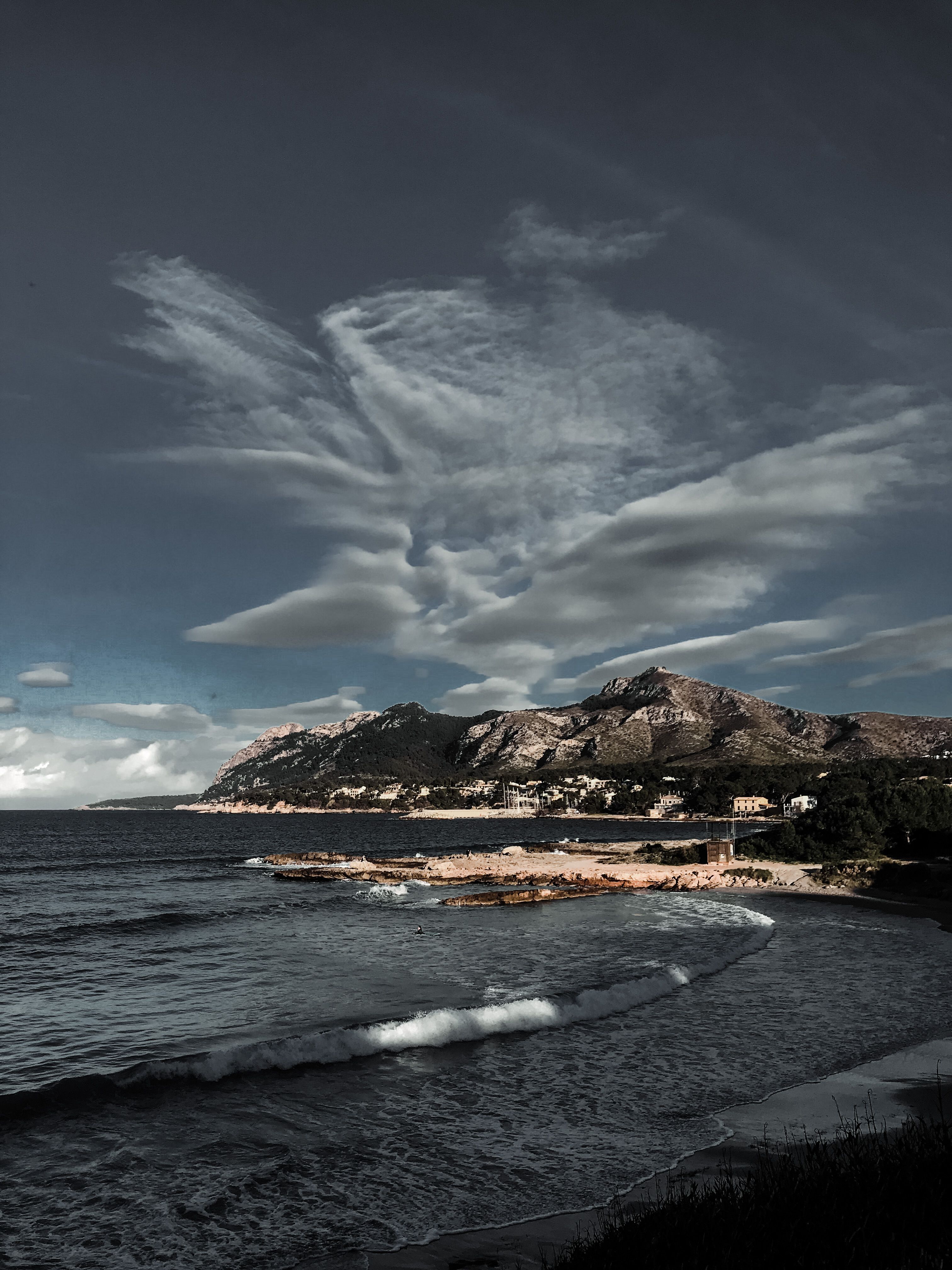Ocean Waves Under Blue Sky · Free Stock Photo