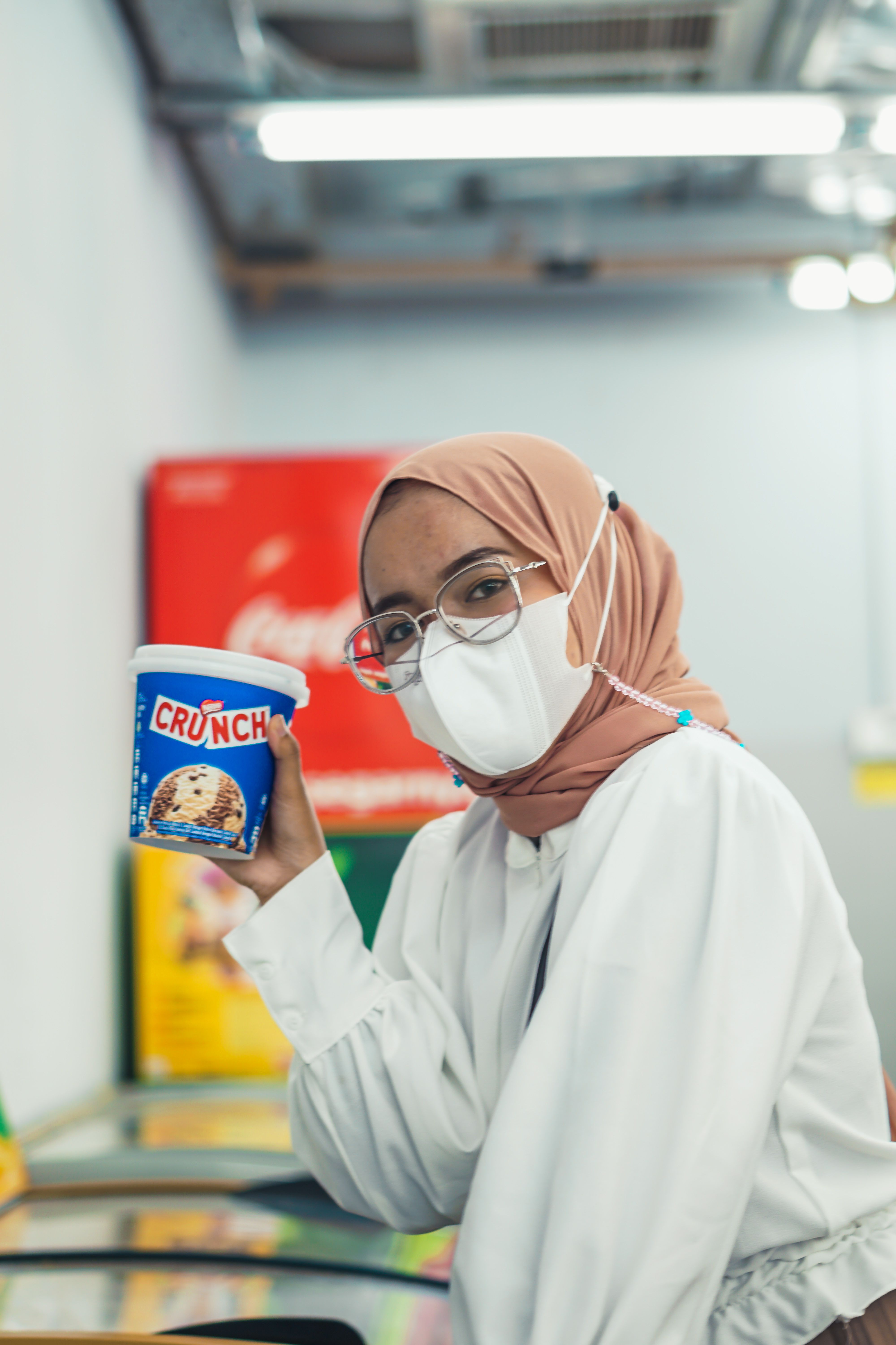 Woman Wearing Face Mask Holding White Disposable Cup · Free Stock Photo