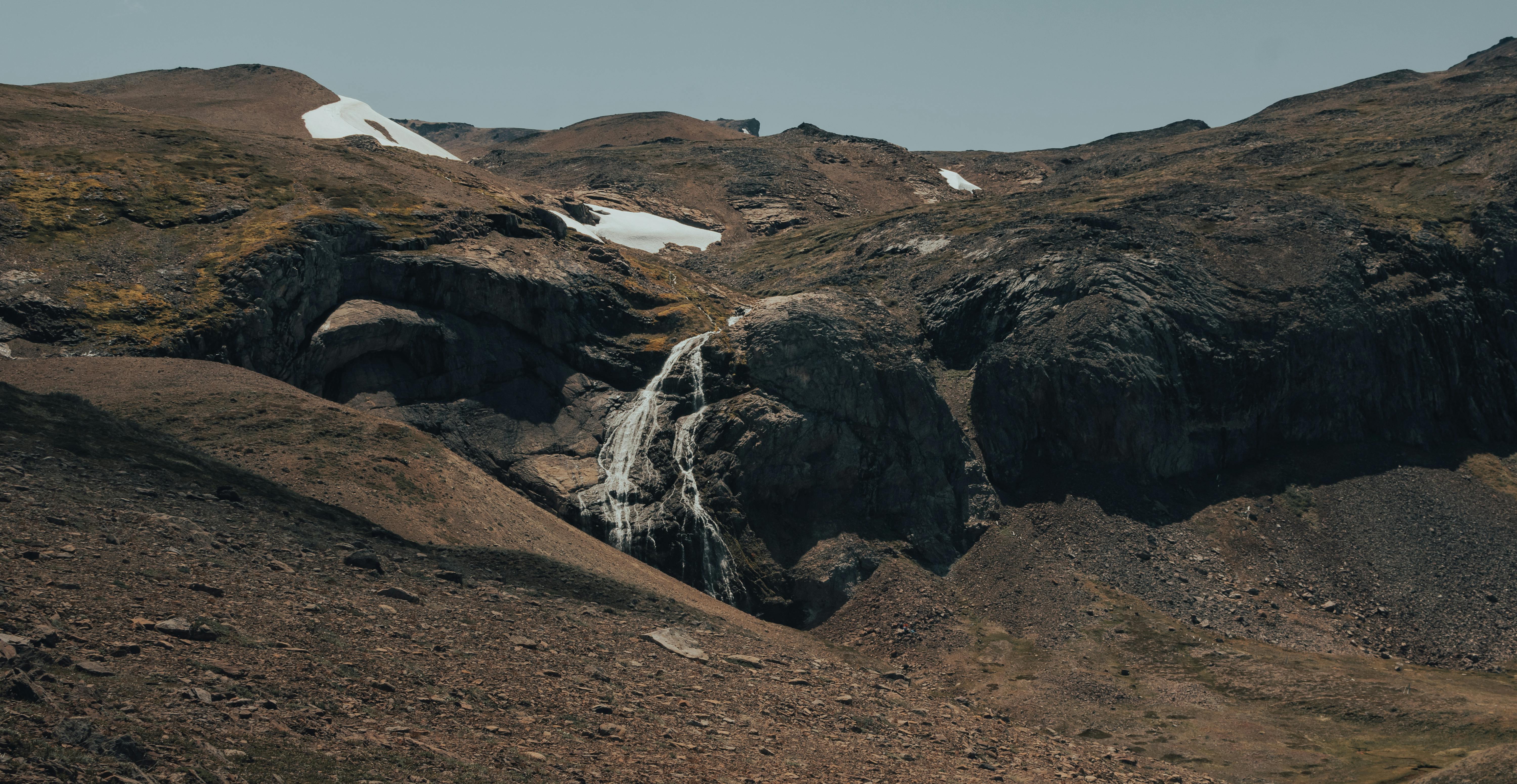 Mountainside with Rock Formations · Free Stock Photo
