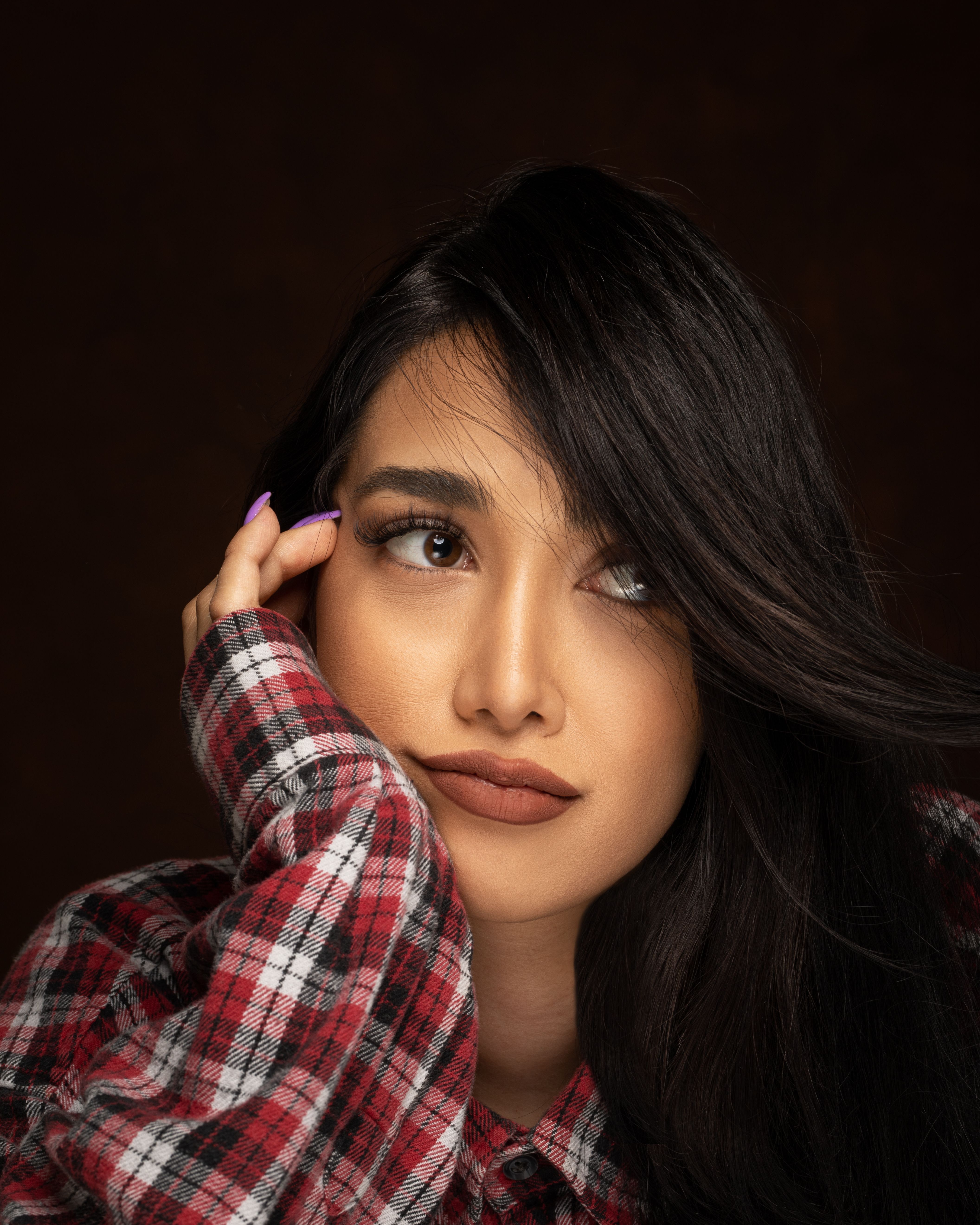 Trendy Asian woman with makeup and uncombed hair · Free Stock Photo