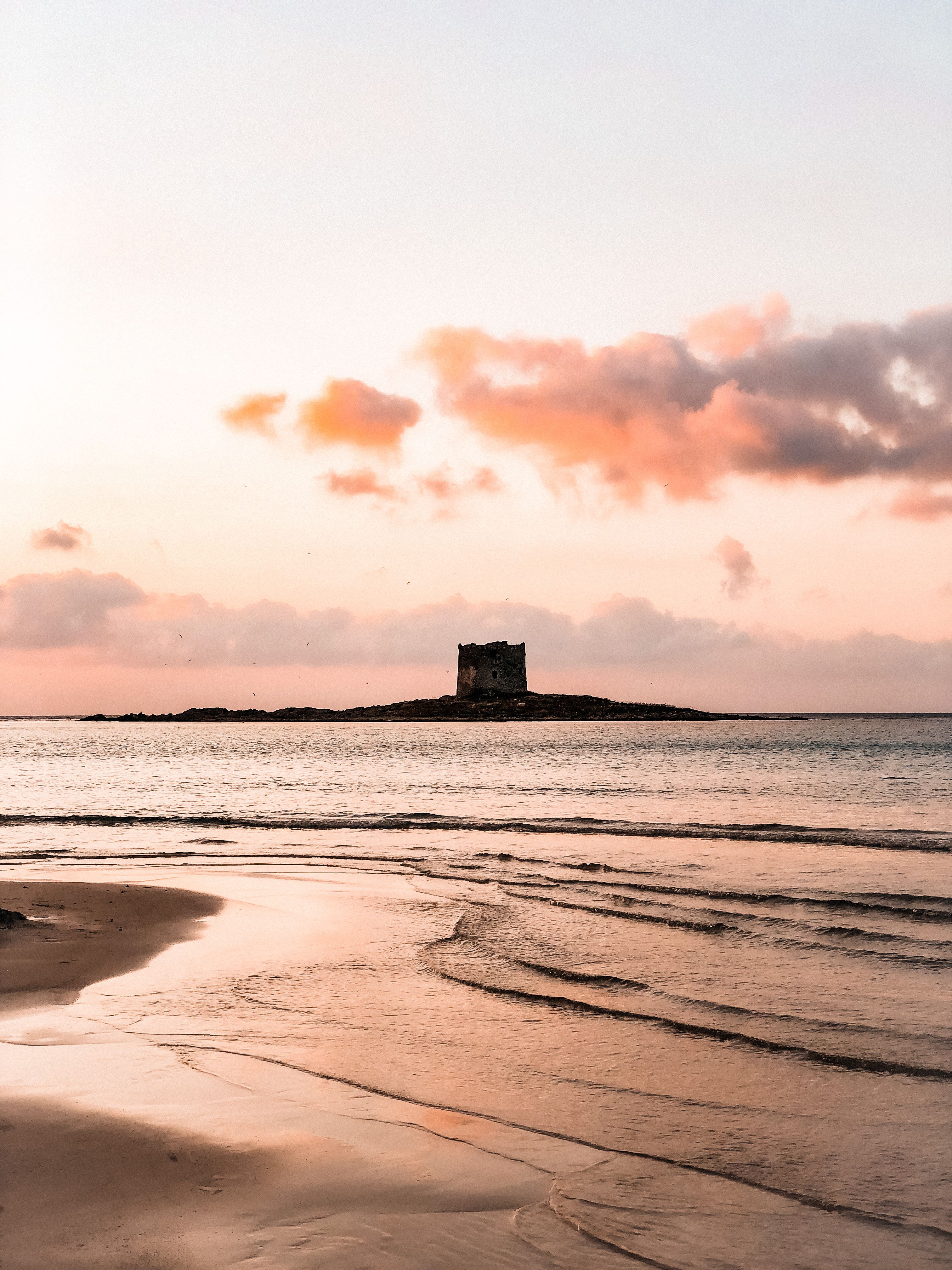 An Island with a Standing Castle Ruin · Free Stock Photo