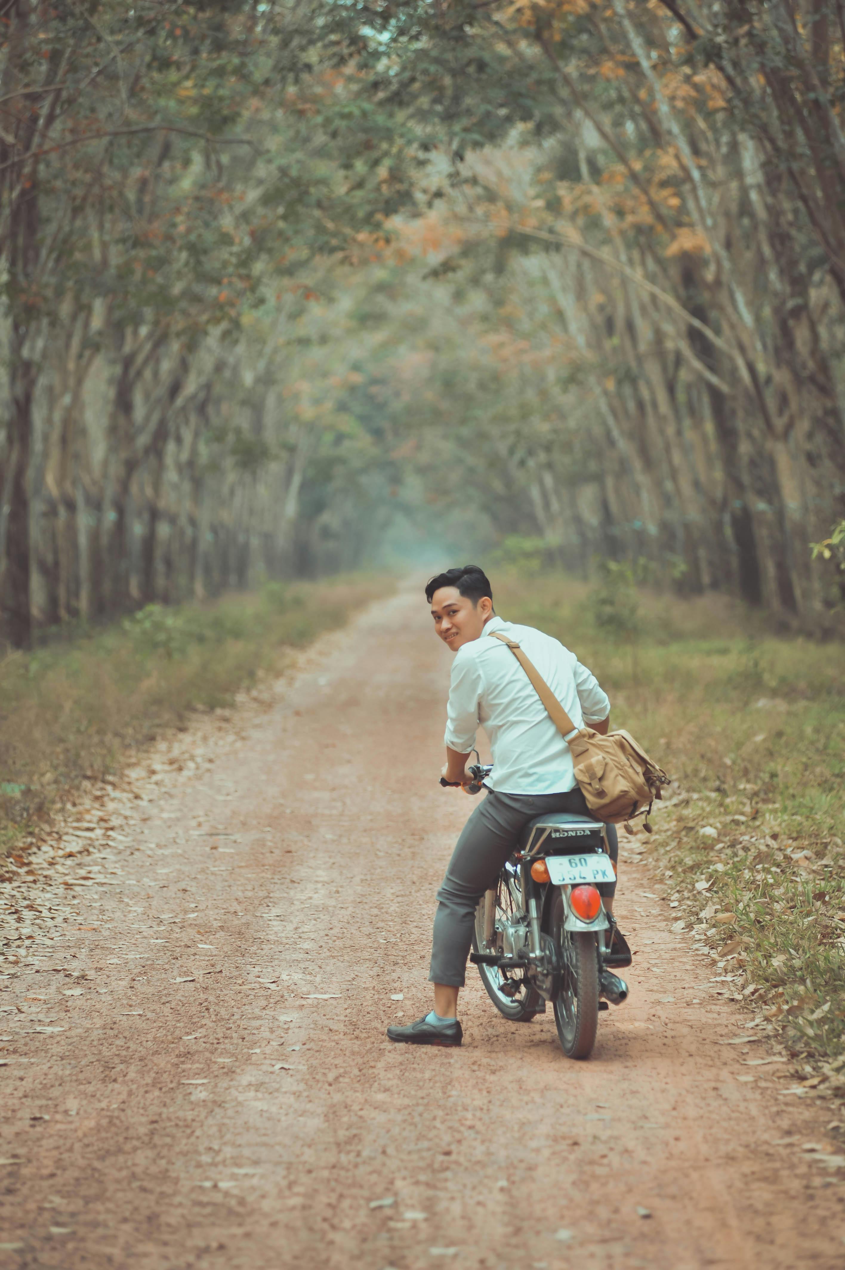 A Man Riding a Motorcycle · Free Stock Photo