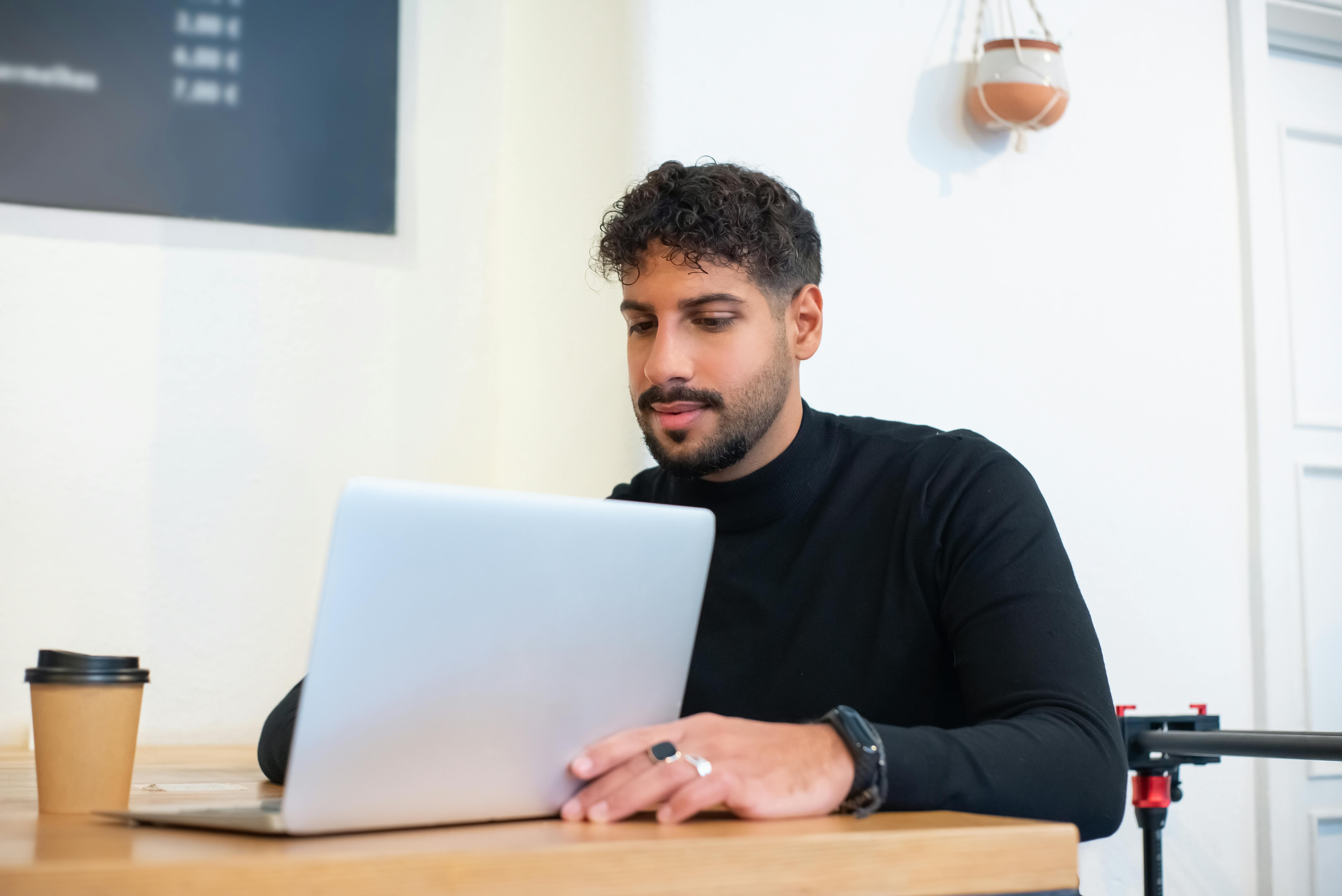 Smiling Man Printing A Label · Free Stock Photo