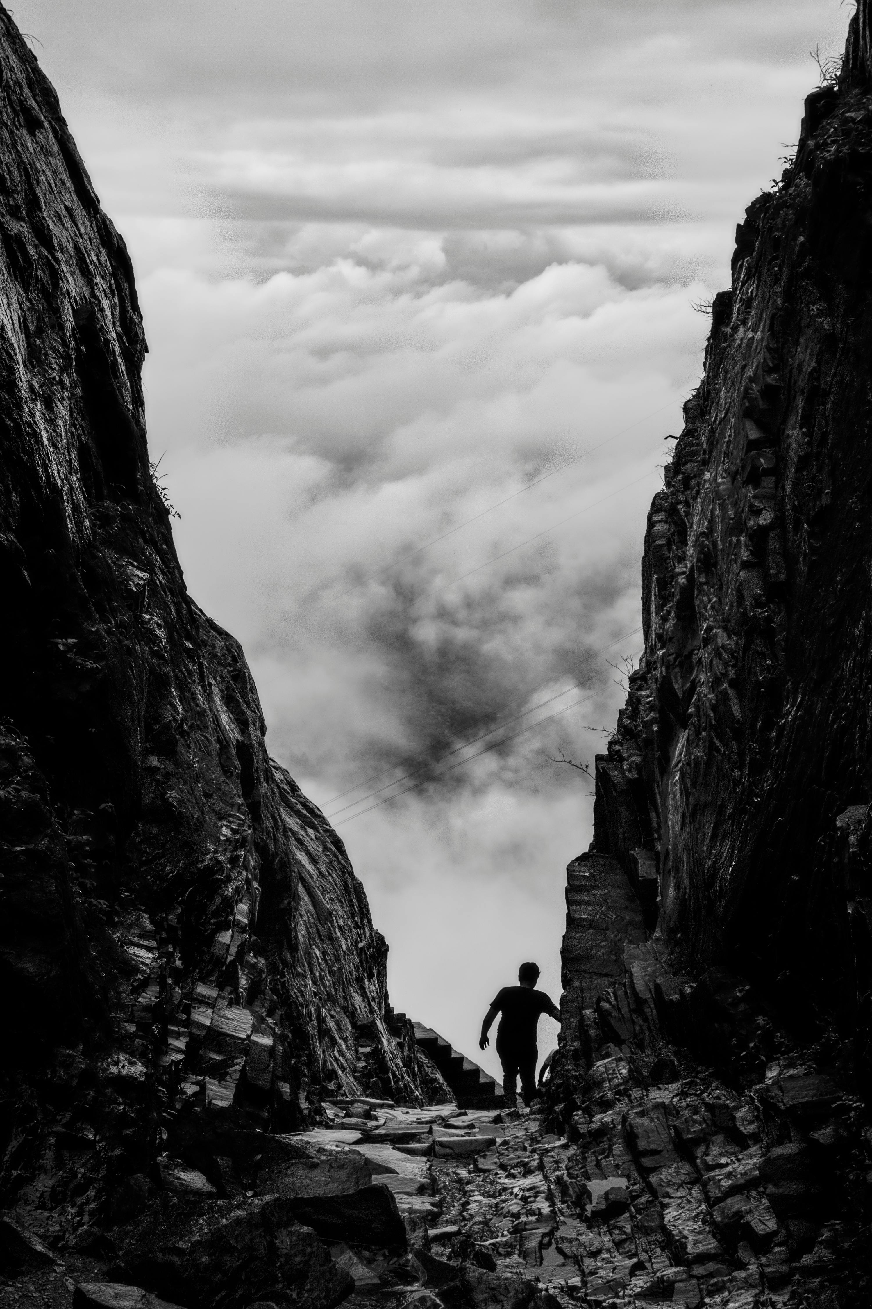 Man Standing on a Cliff · Free Stock Photo