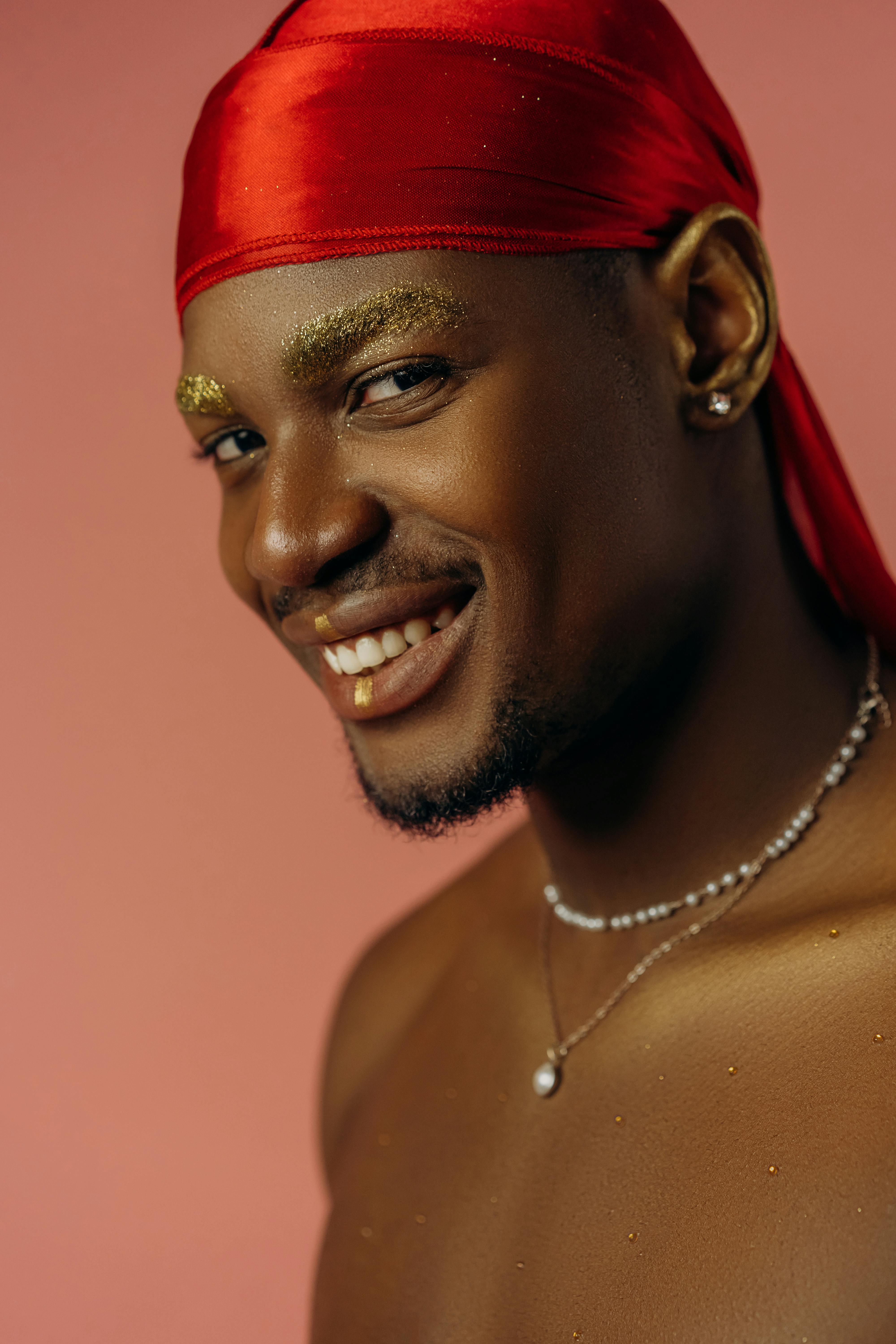 Shirtless Man Wearing Red Durag Smiling · Free Stock Photo