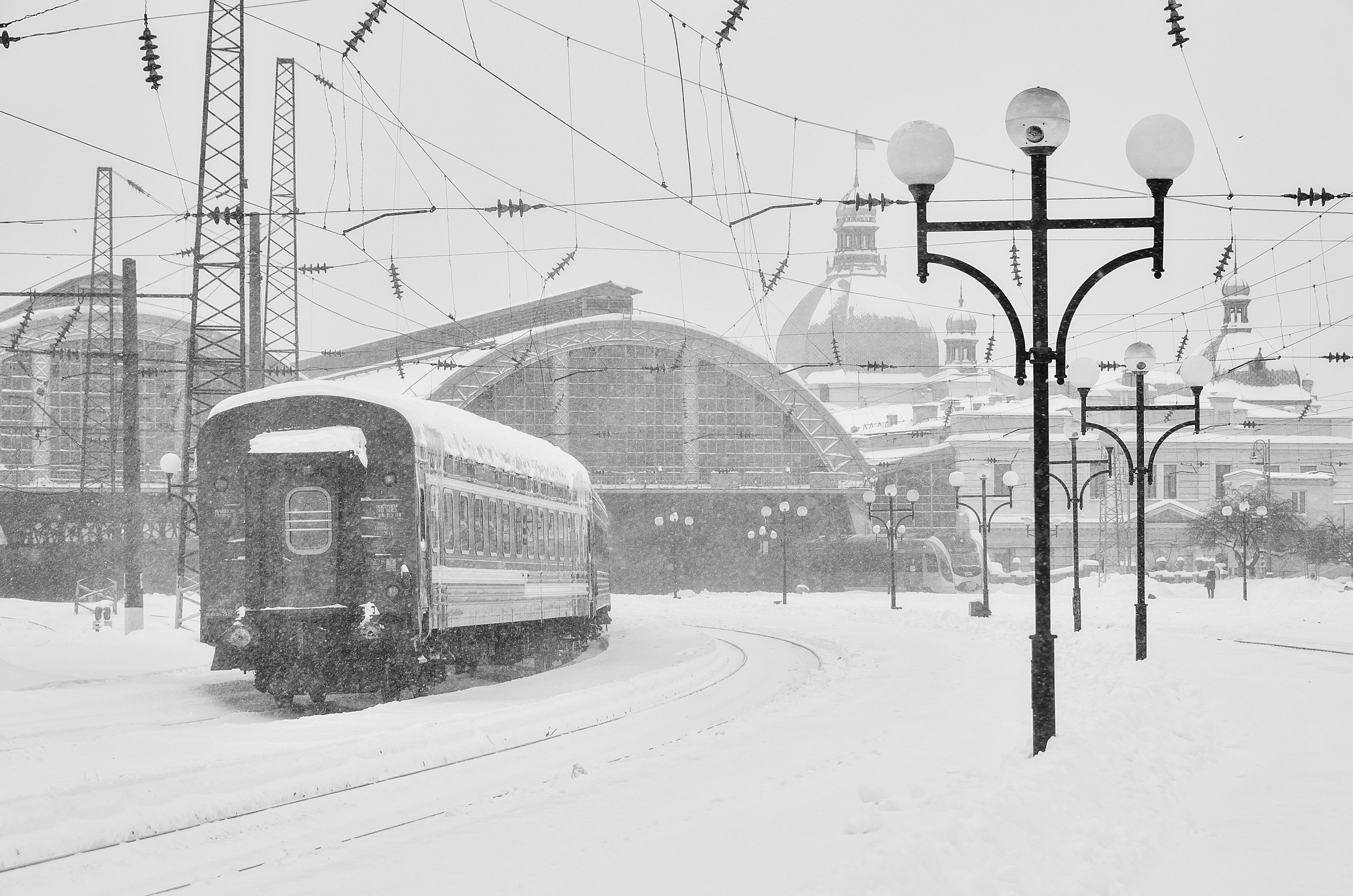 Snow Covered Ground Around A Train Station · Free Stock Photo
