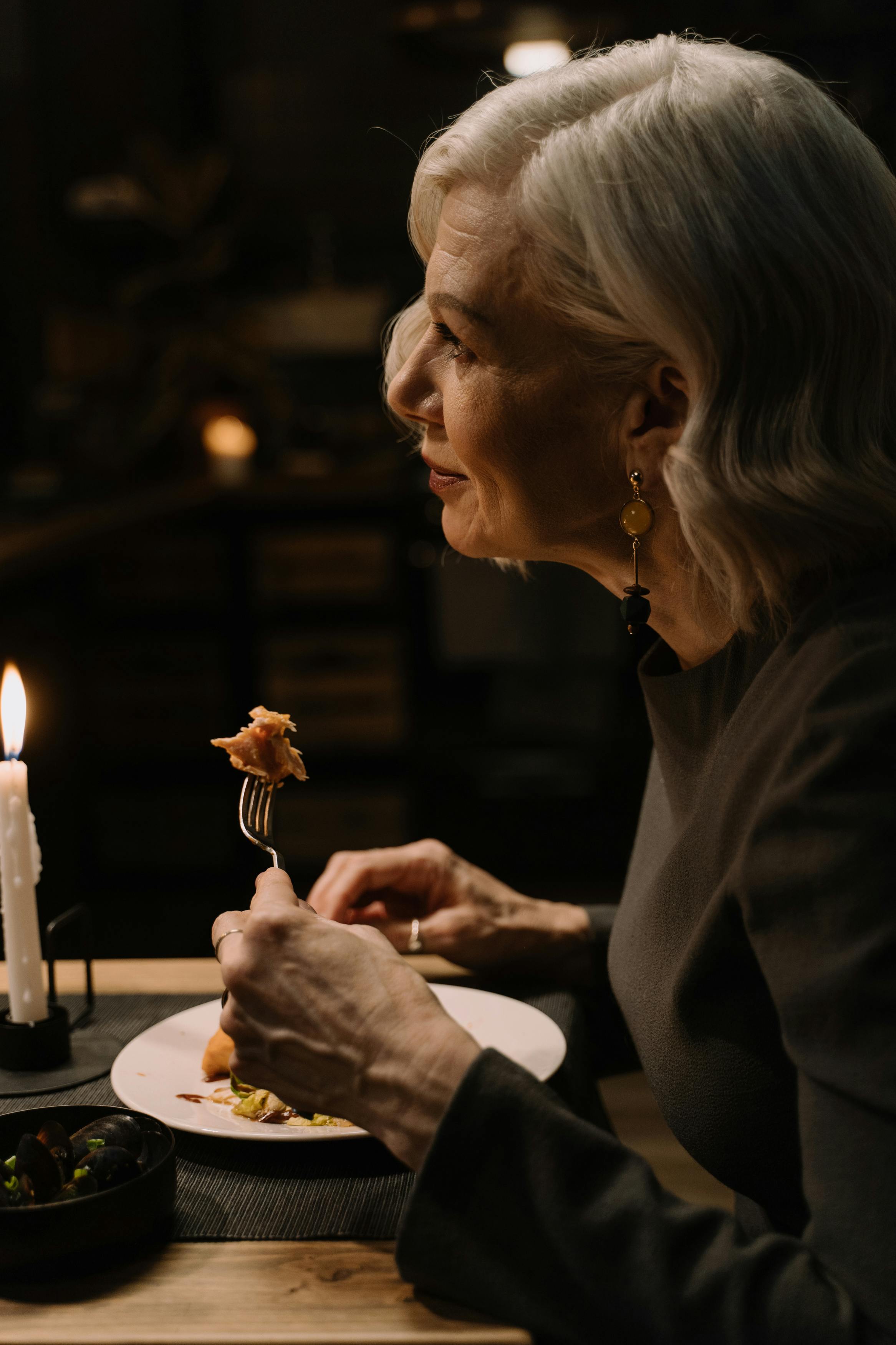 An Elderly Woman Having Dinner · Free Stock Photo