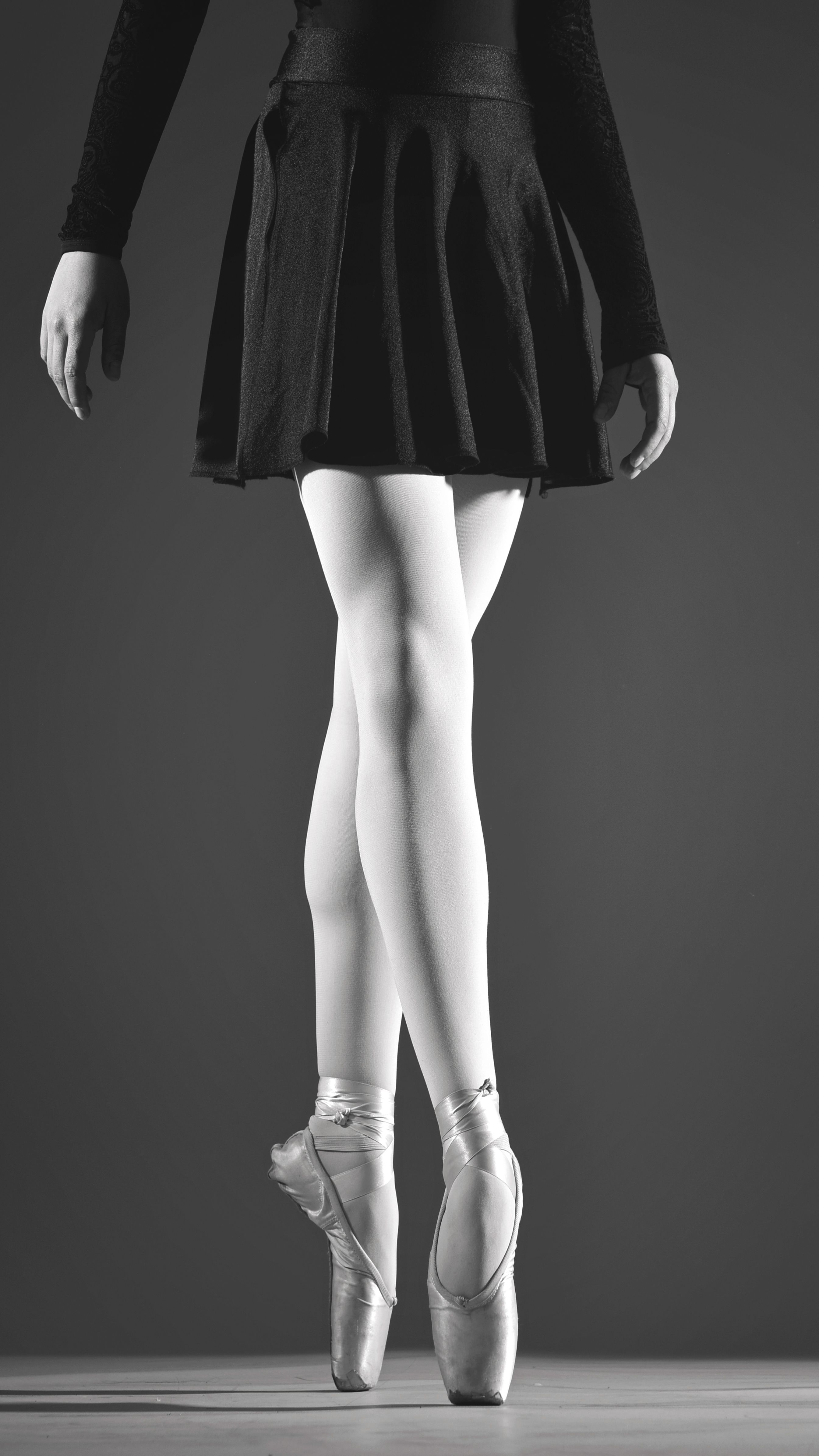 A Woman Wearing Ballet Shoes · Free Stock Photo