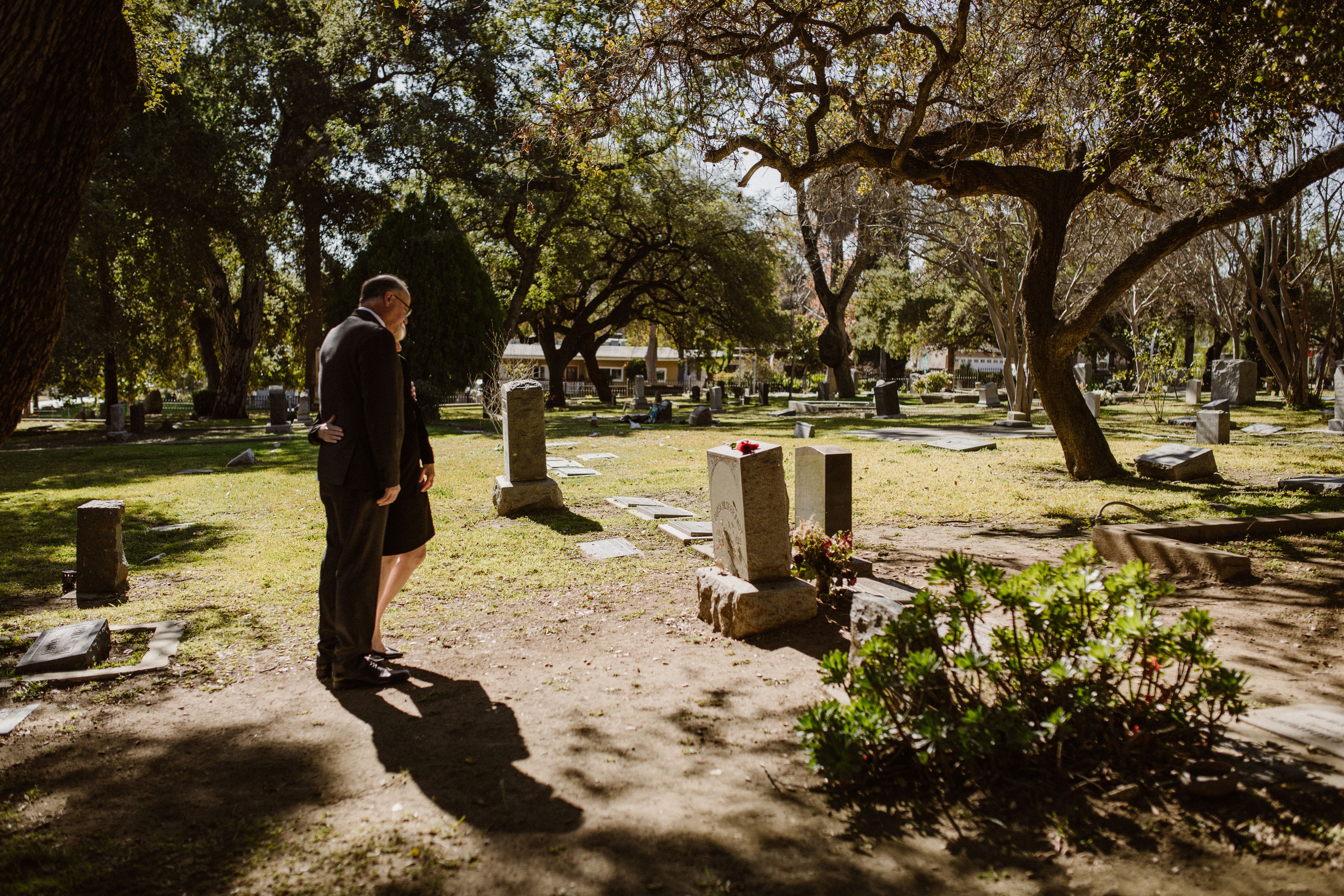 A Couple Grieving at the Cemetery · Free Stock Photo