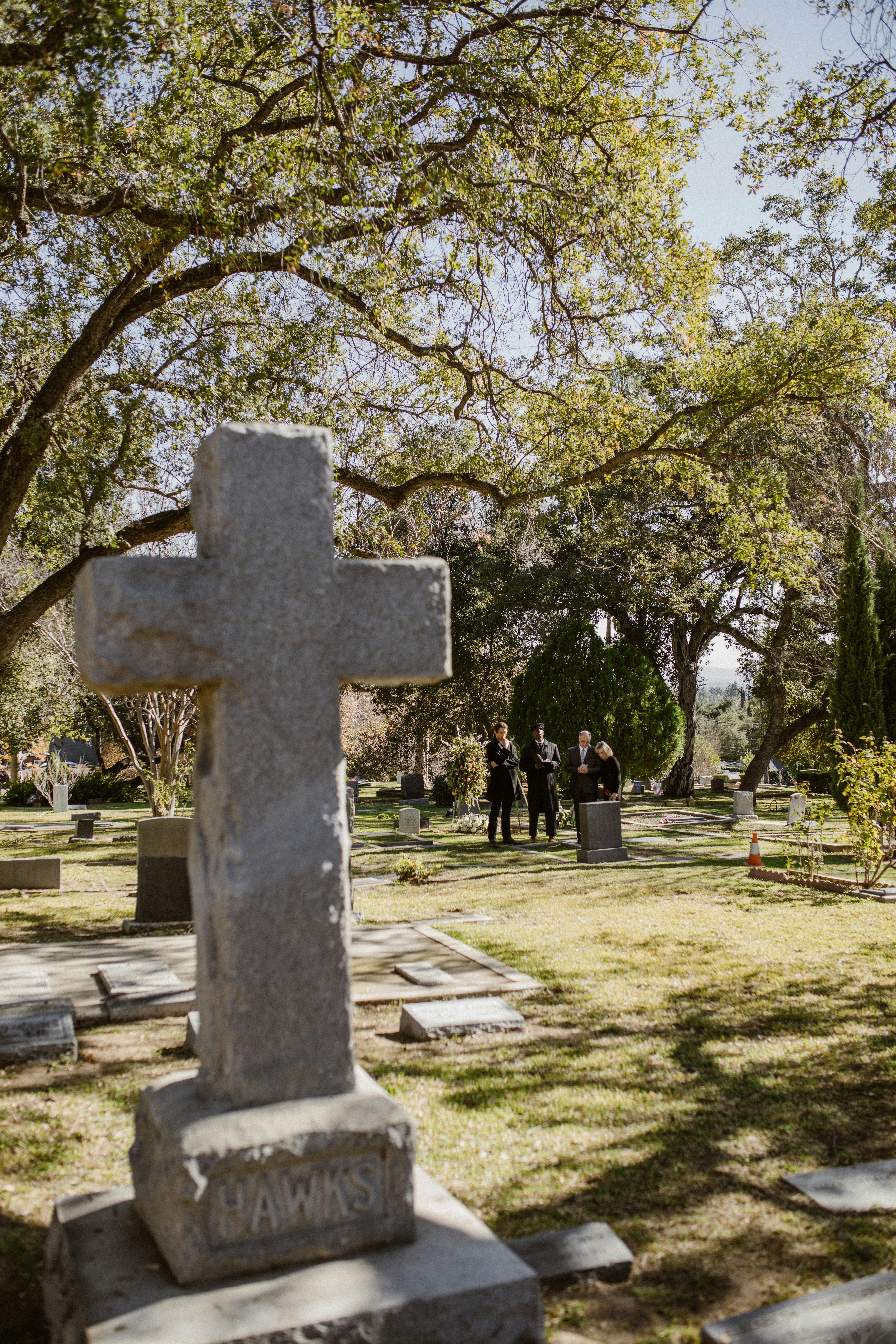 Photo of People on Cemetery during Daytime · Free Stock Photo