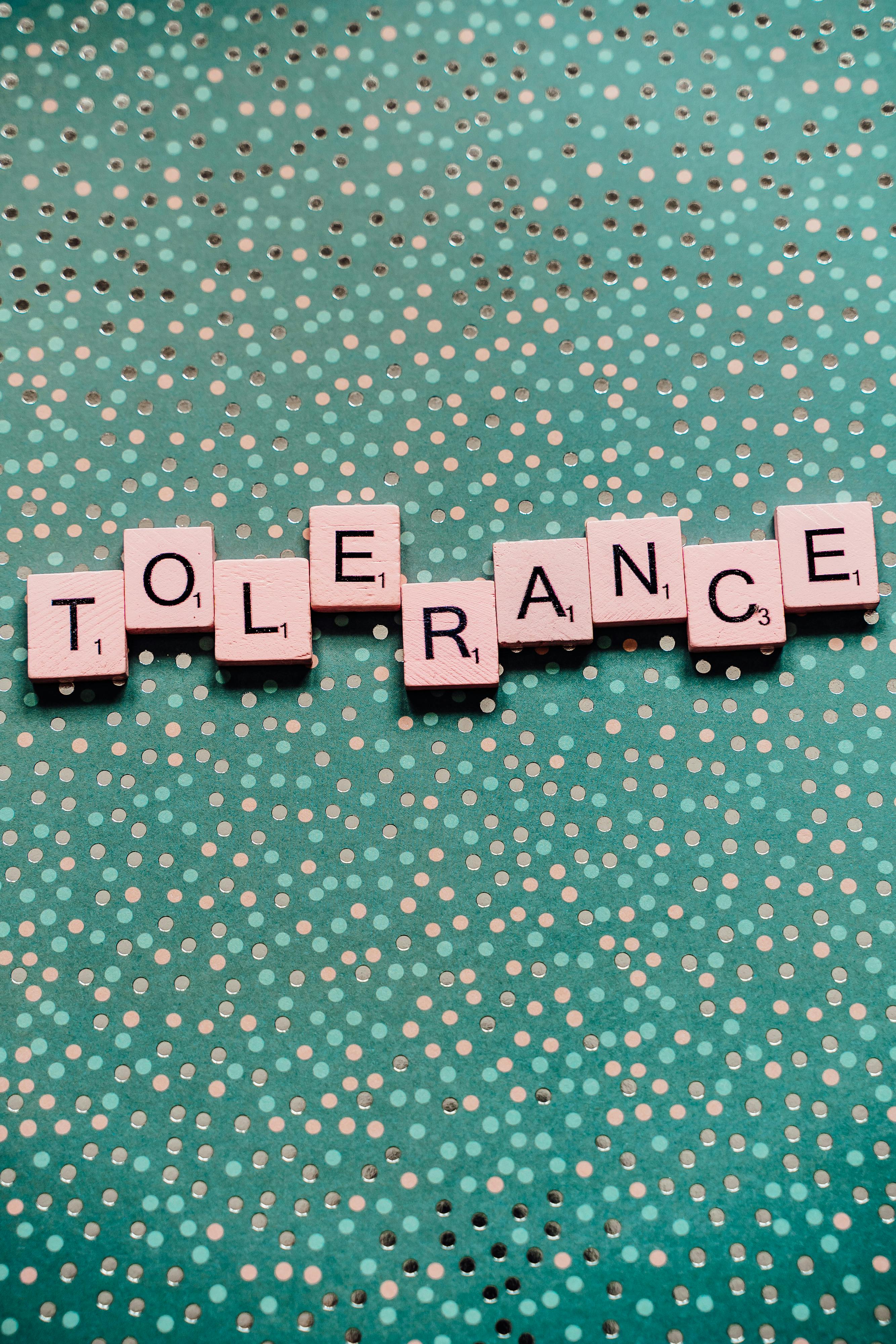 Tolerance Word in White Scrabble Tiles · Free Stock Photo