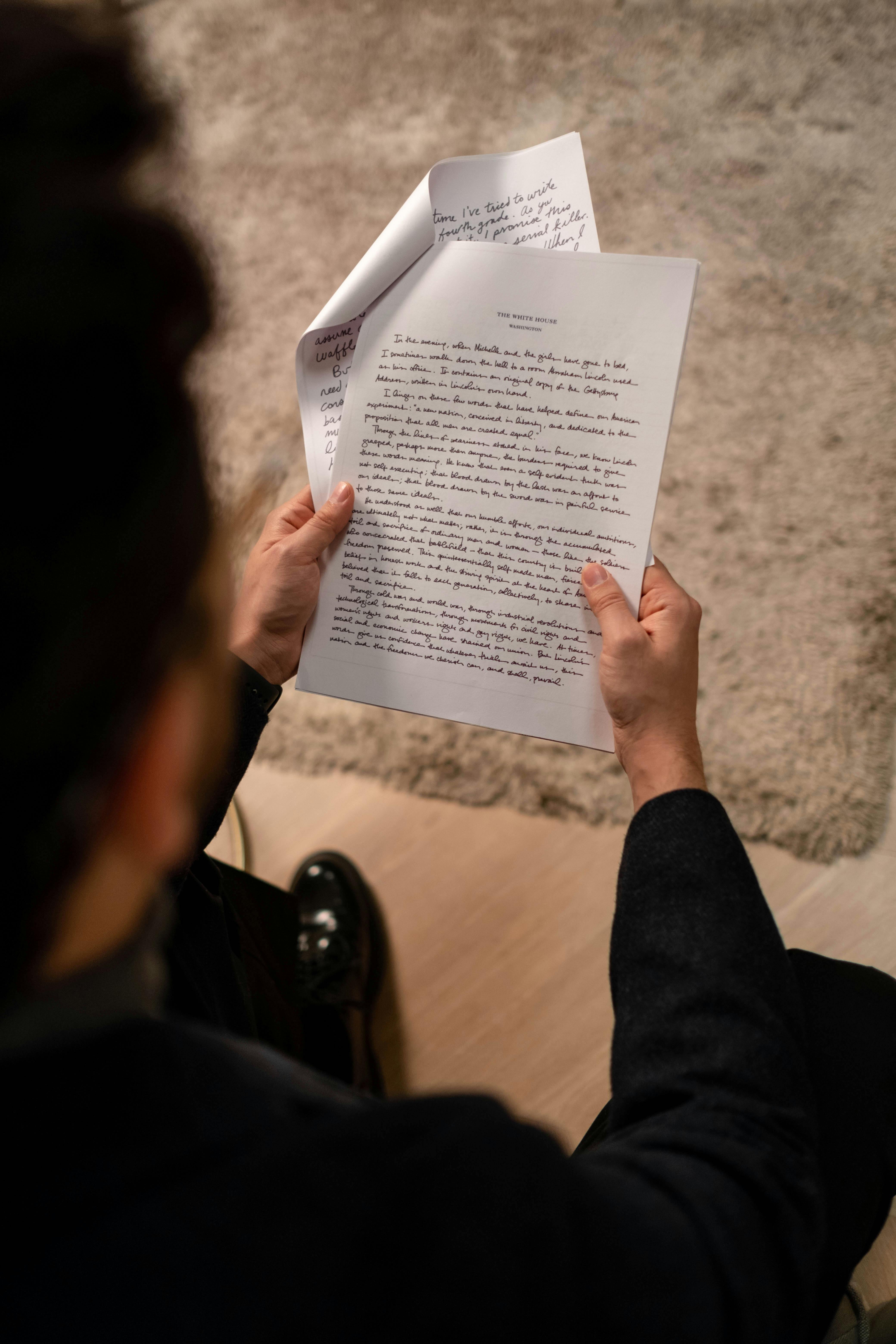 Person Holding a Handwritten Letter · Free Stock Photo