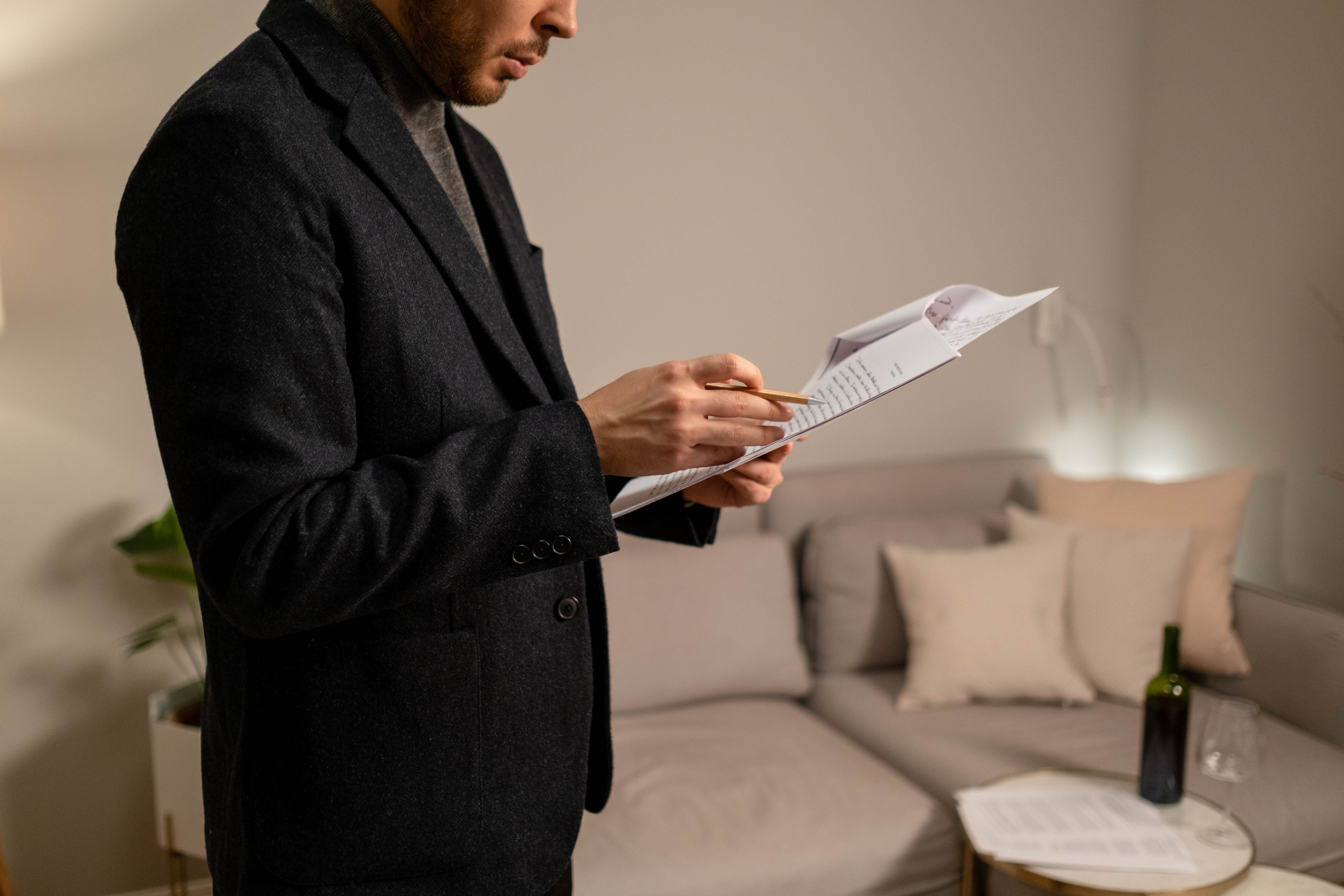 Man Reading a Script · Free Stock Photo