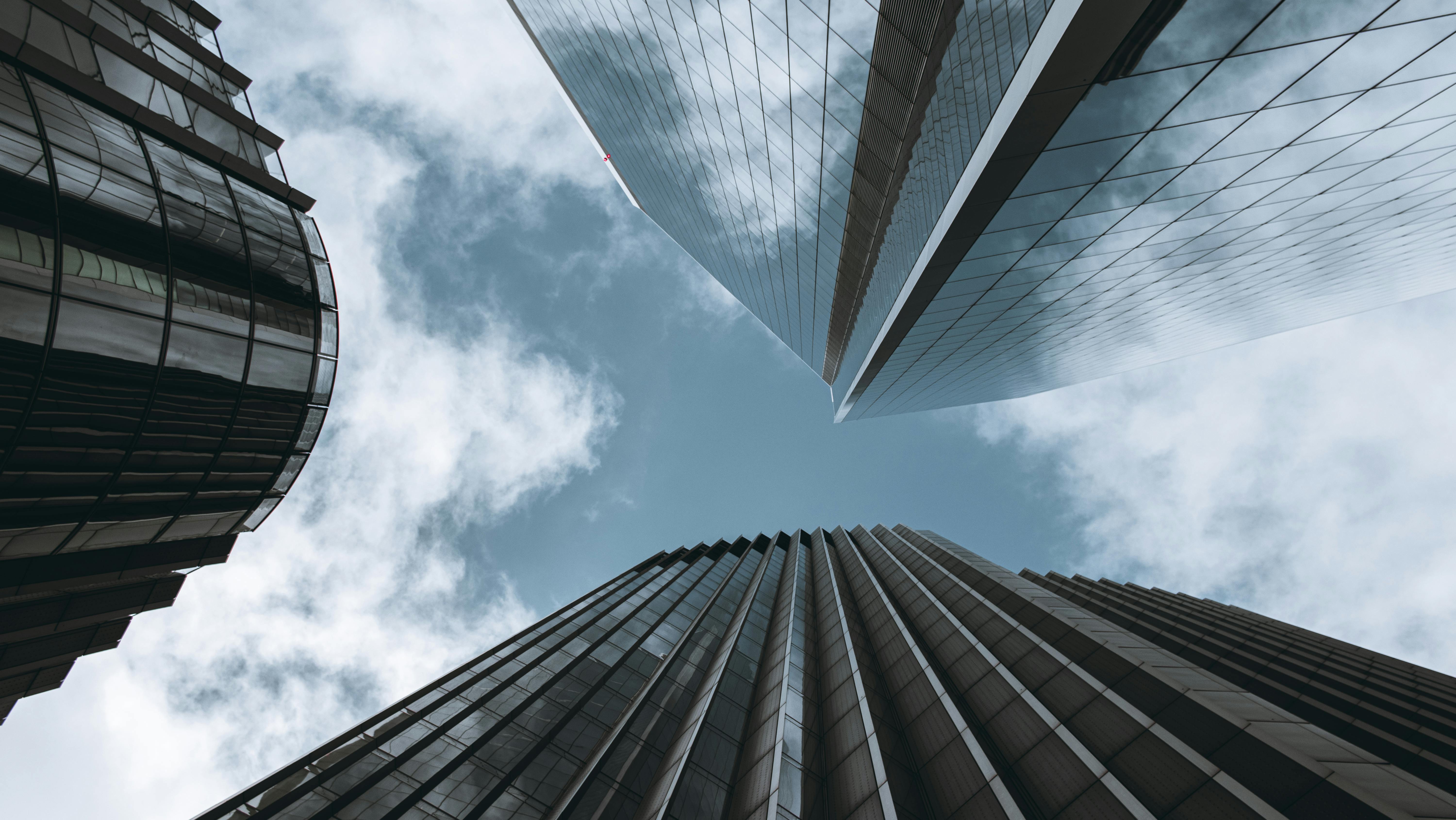Low Angle Glass High Rise Building · Free Stock Photo