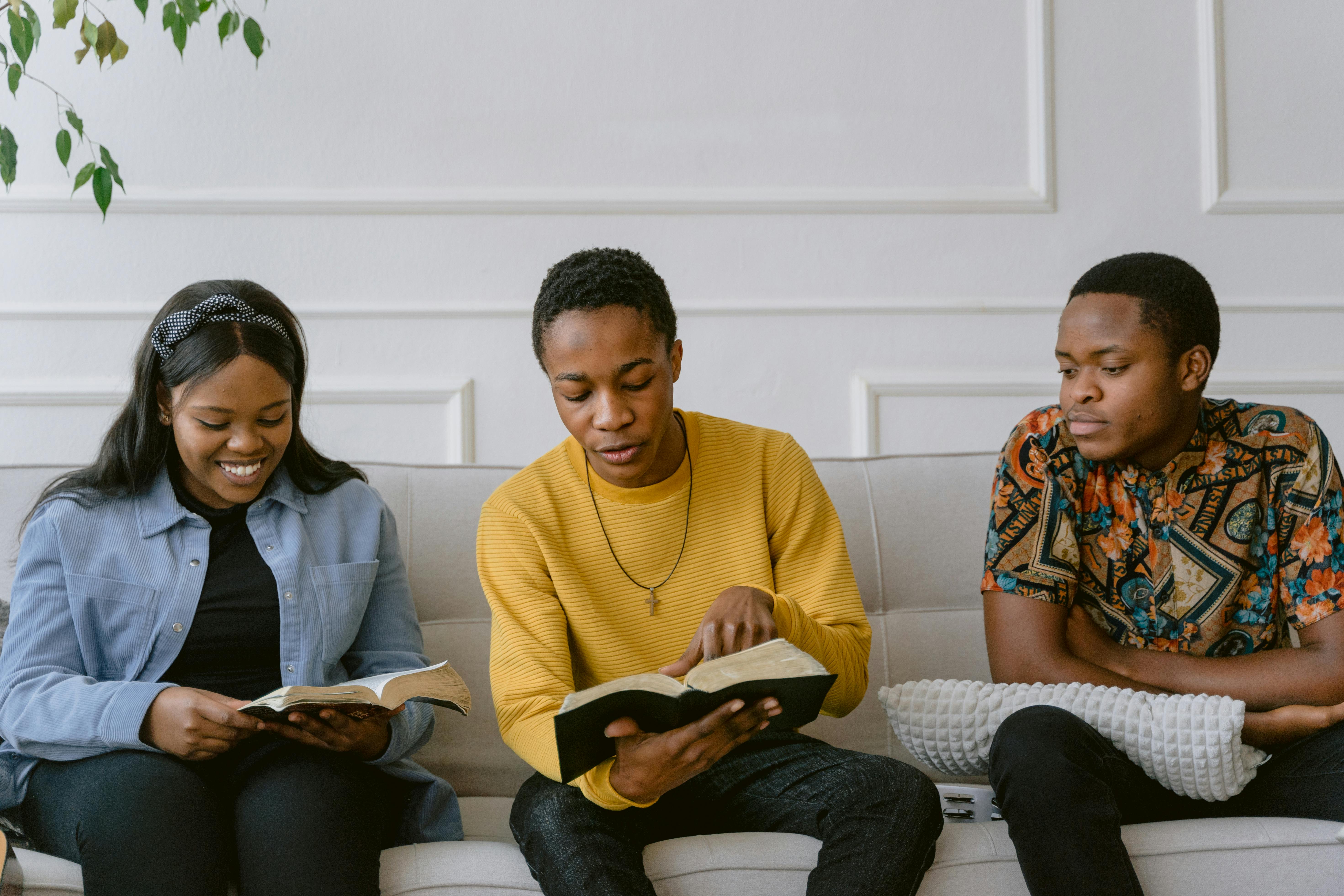 People Sitting on a Couch · Free Stock Photo