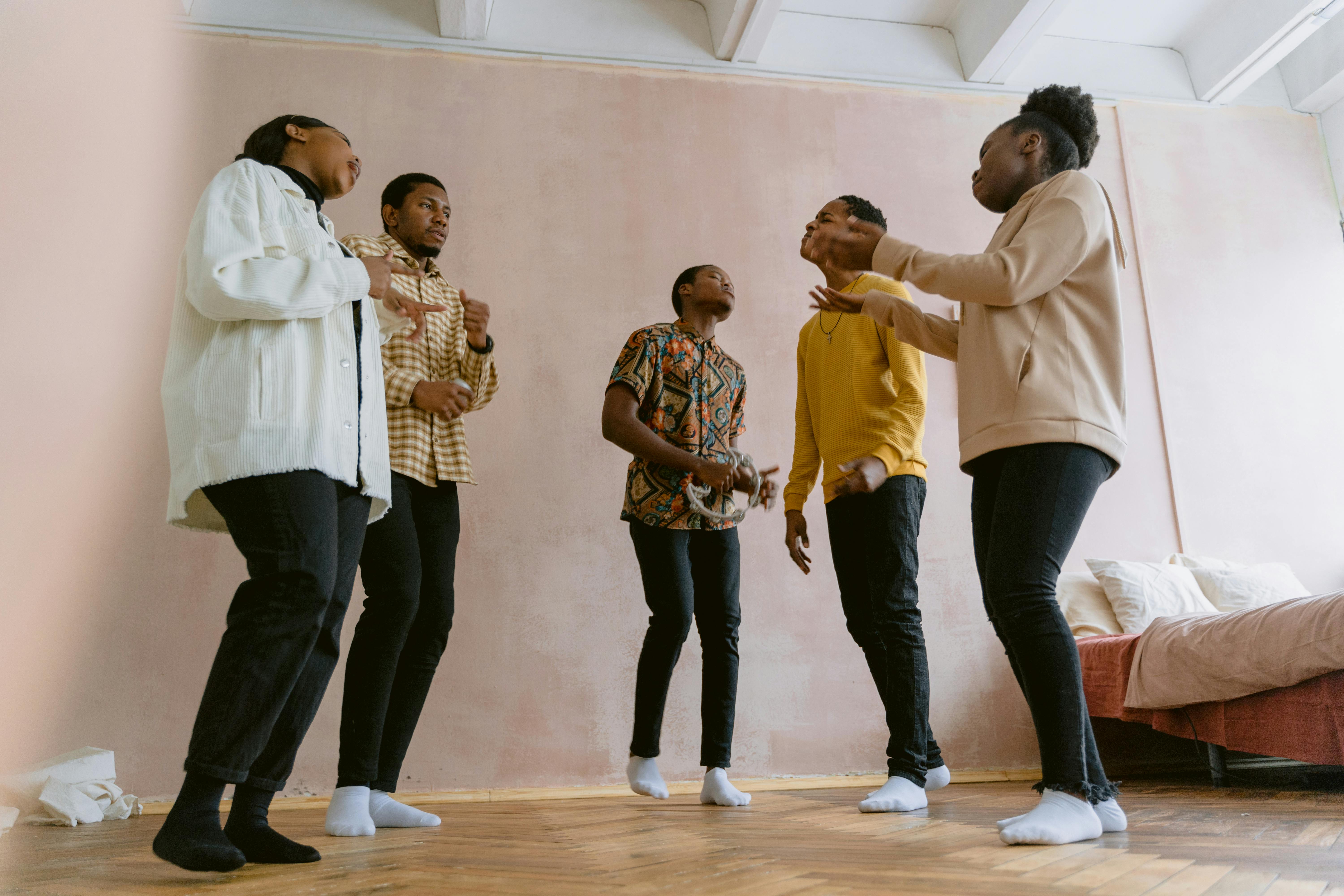 Group of People Dancing and Singing · Free Stock Photo
