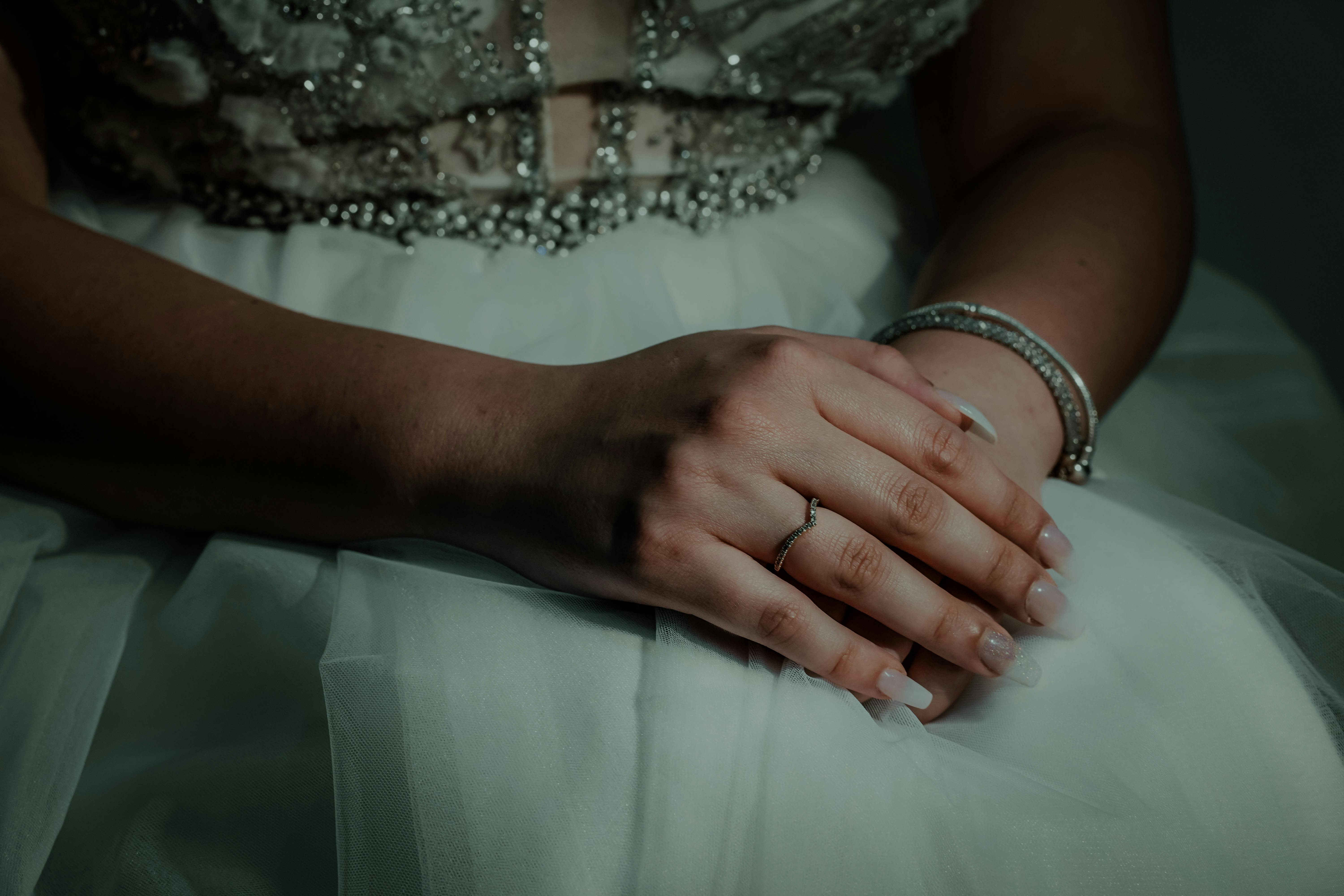 Woman with Hands on Lap · Free Stock Photo