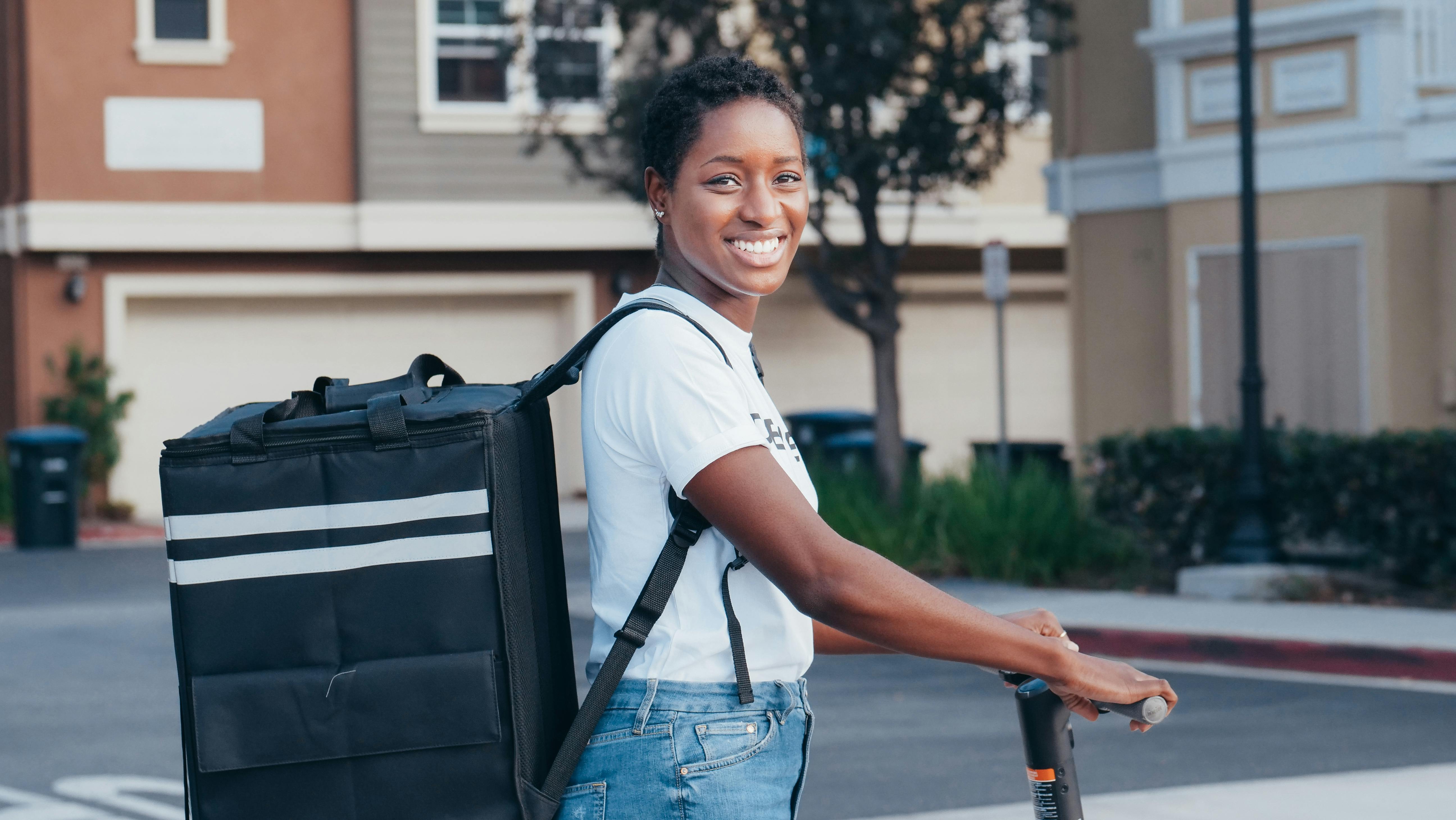 A Woman Making a Delivery · Free Stock Photo