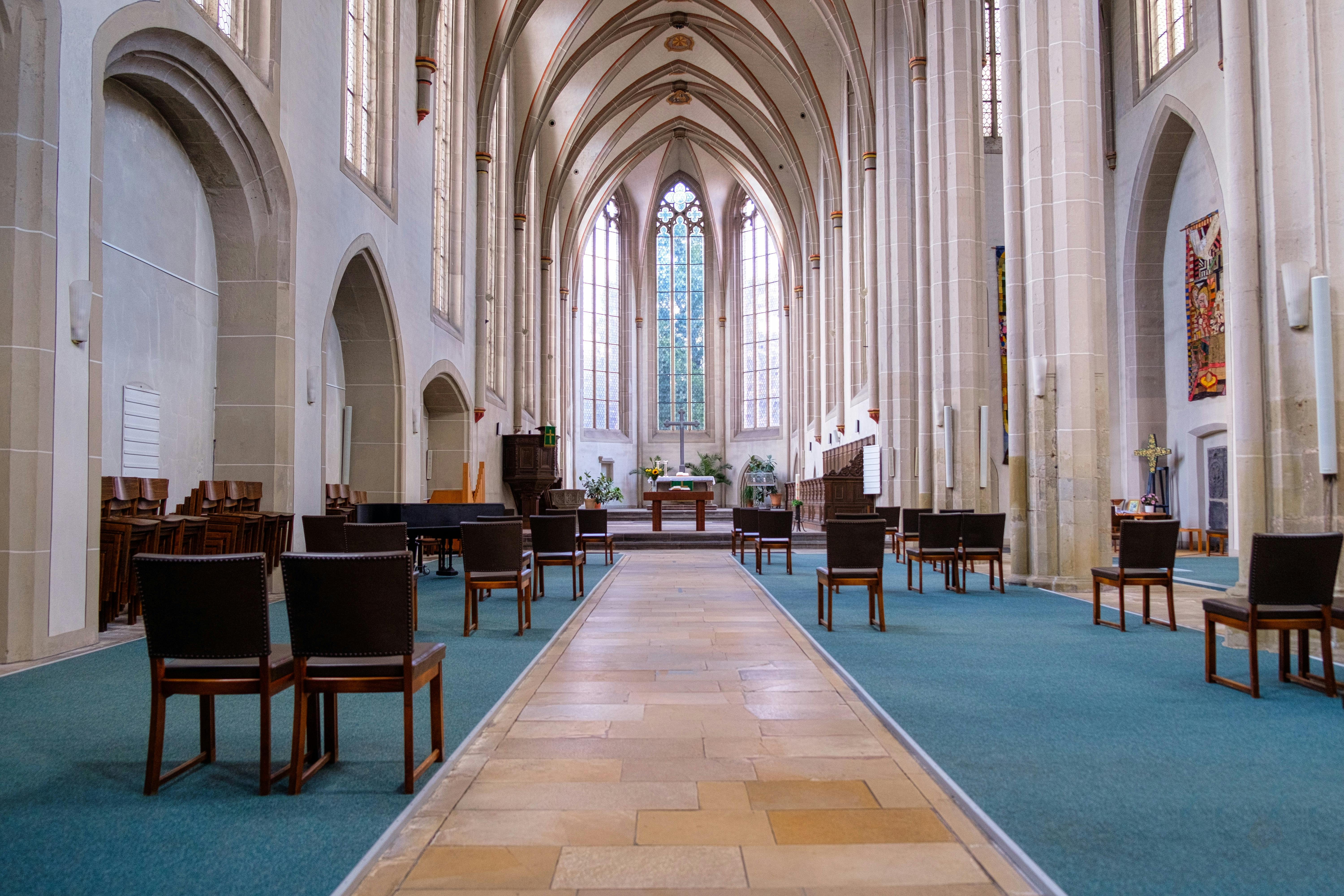 Brown Wooden Church Pew Align Facing the Altar · Free Stock Photo