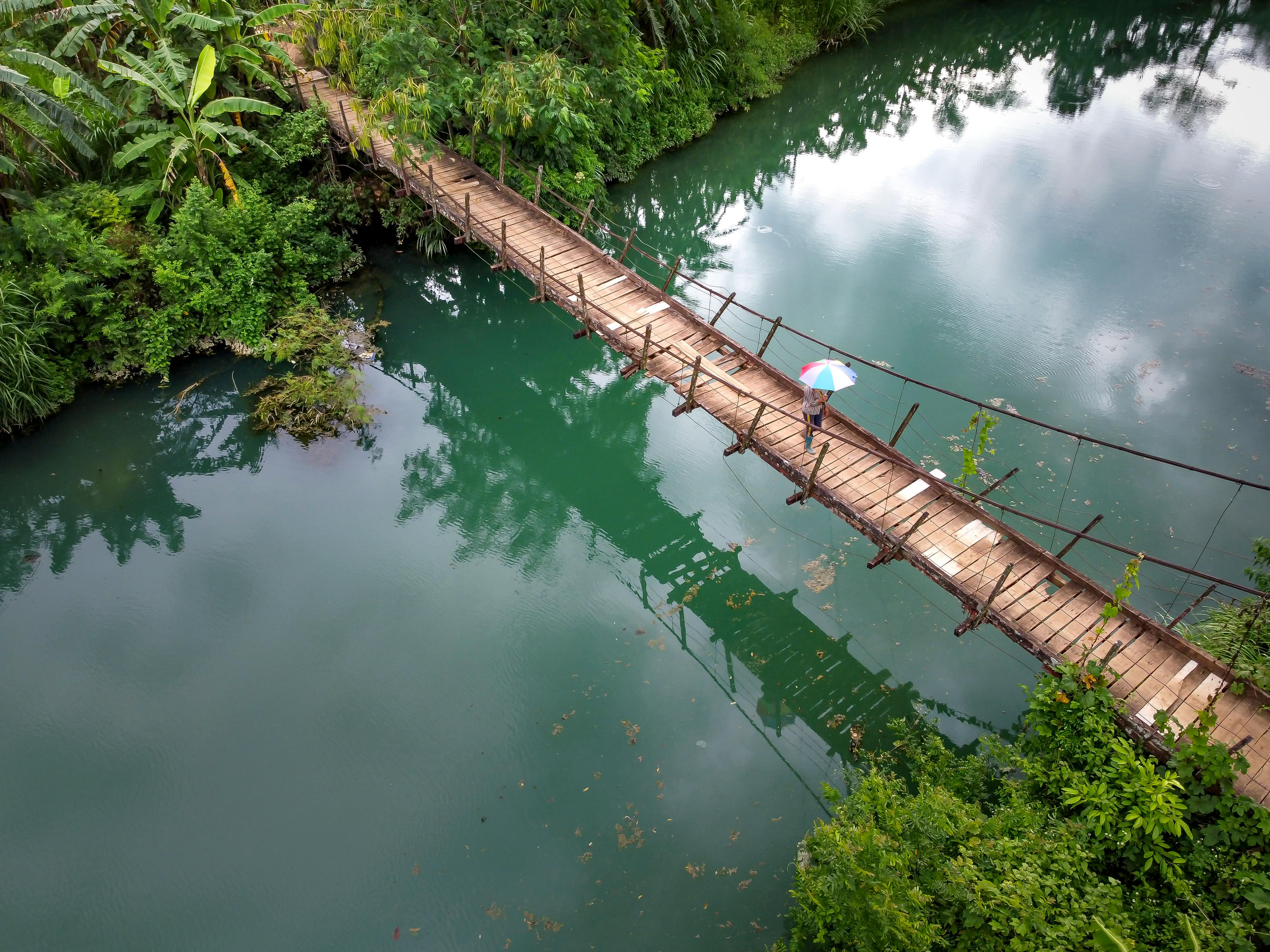 Brown Wooden Bridge over the River · Free Stock Photo