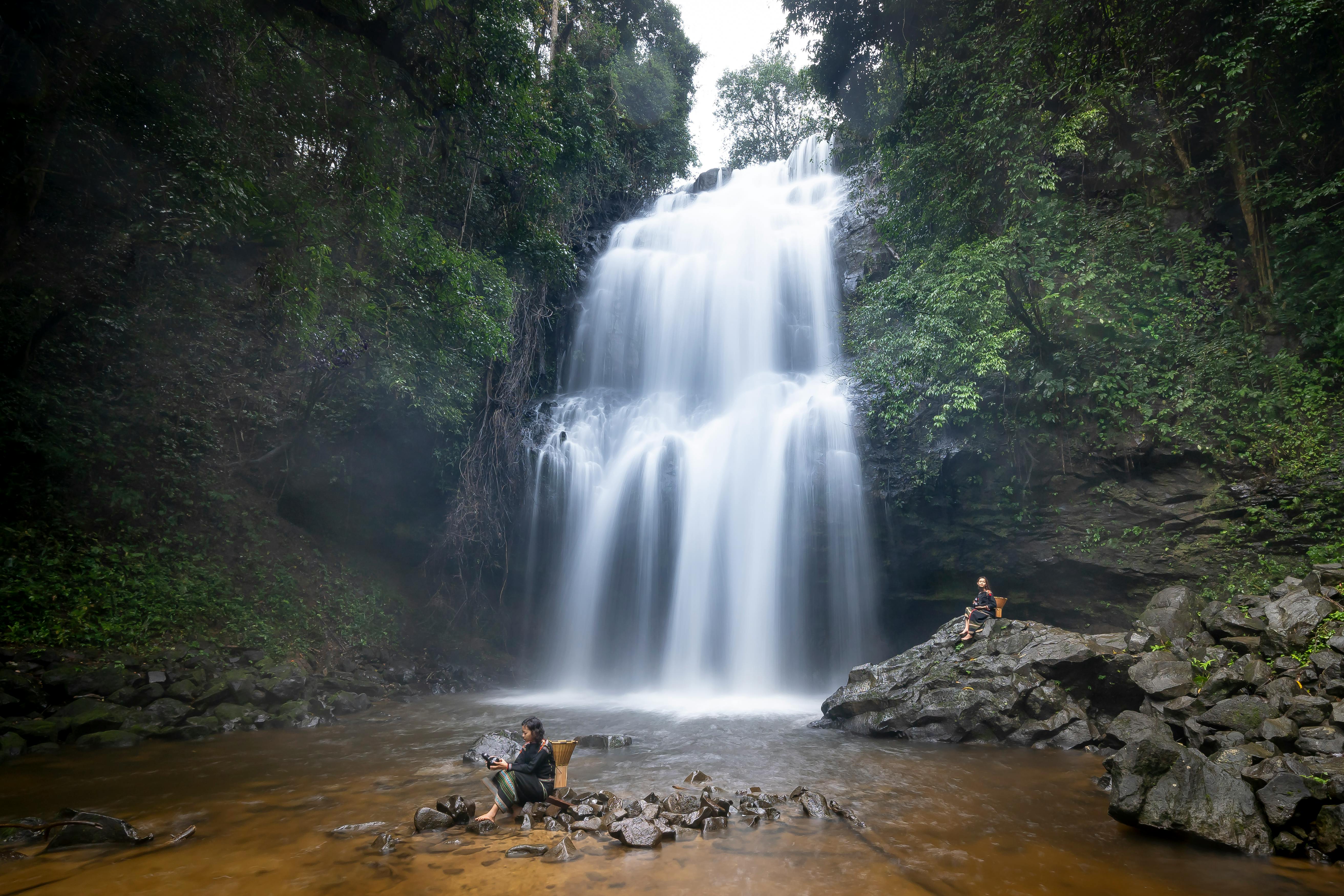 People Holding Hands by Waterfall · Free Stock Photo