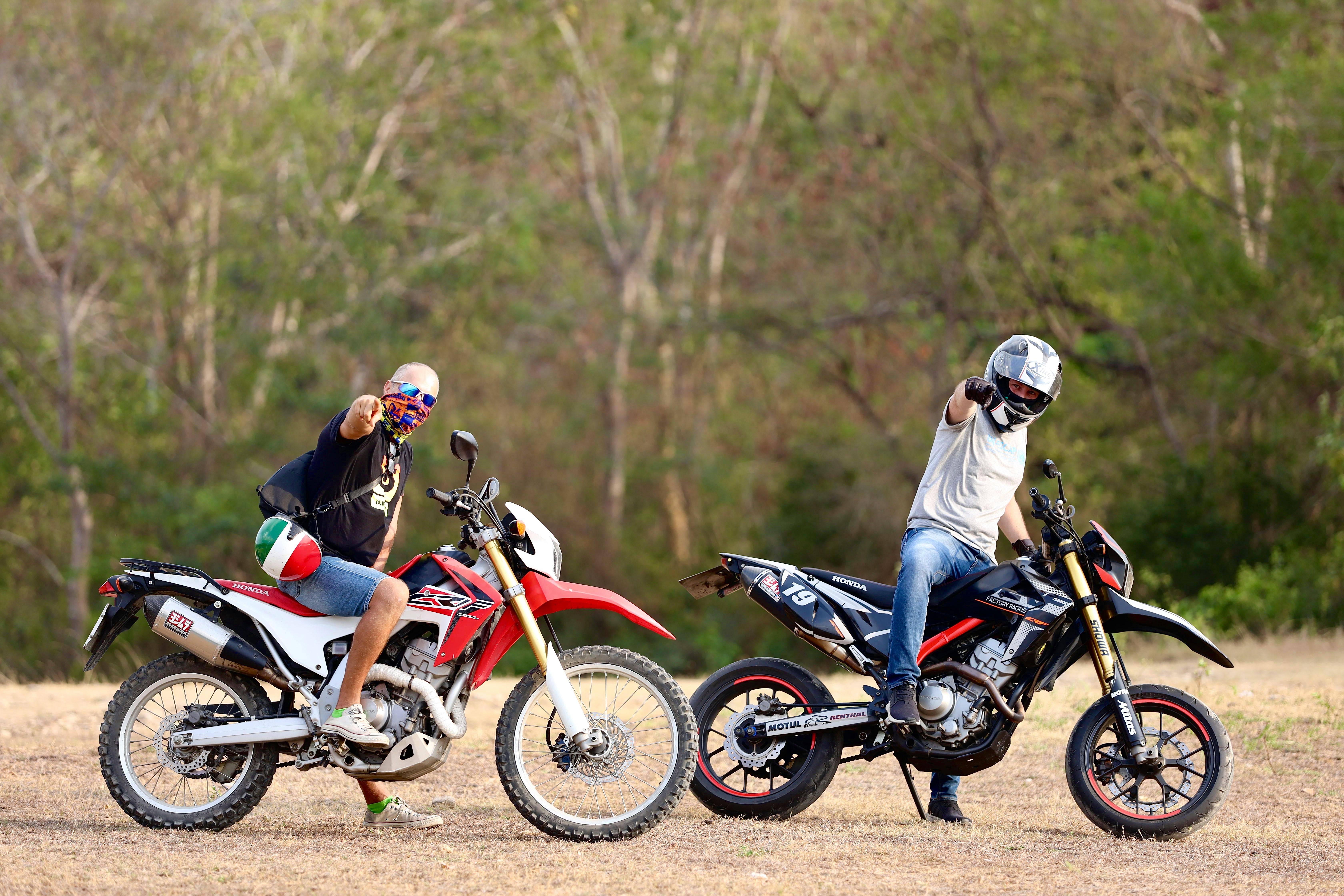 Two Men Riding on Motorbikes · Free Stock Photo