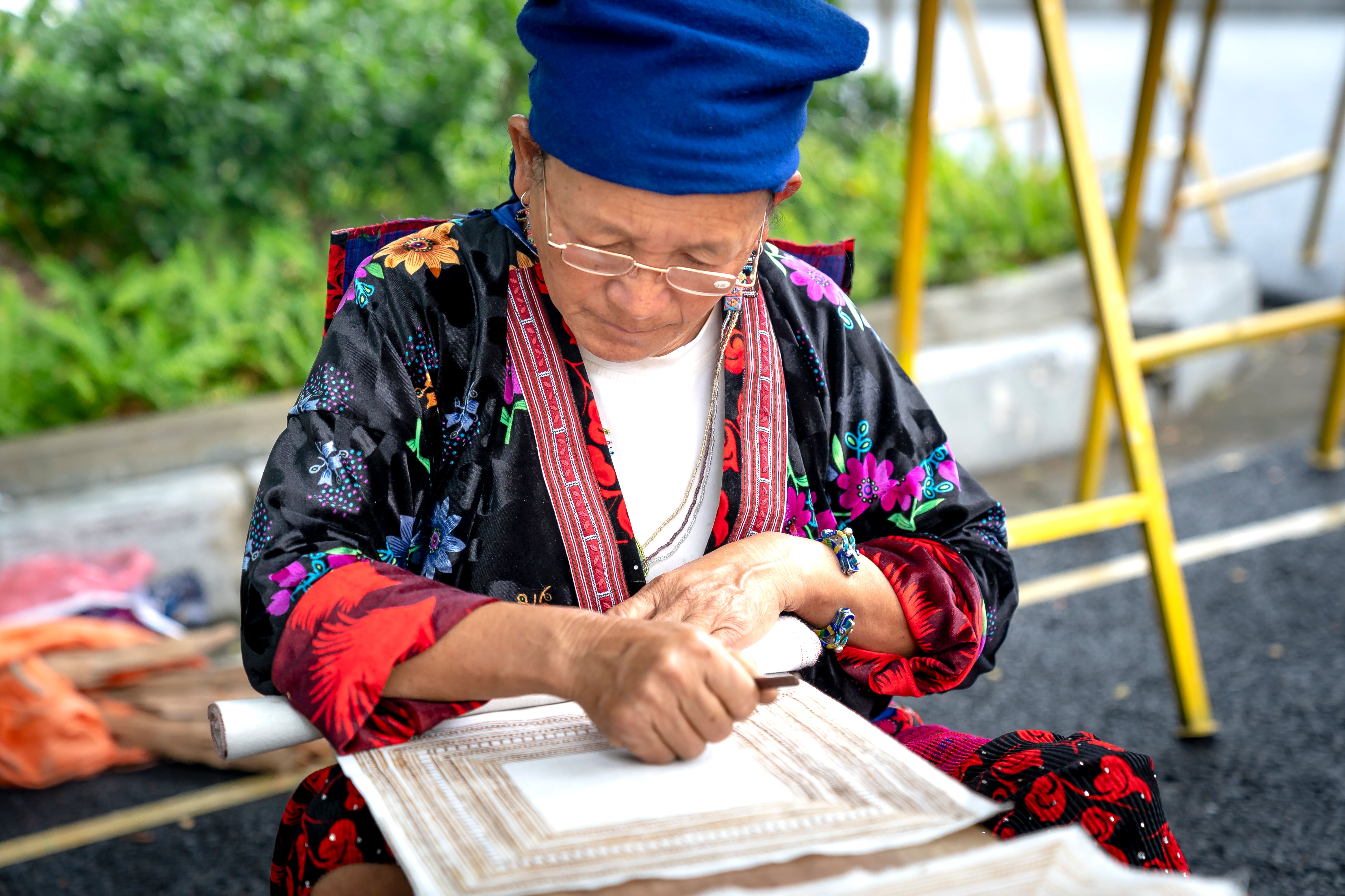 Woman Working in Traditional Clothing · Free Stock Photo