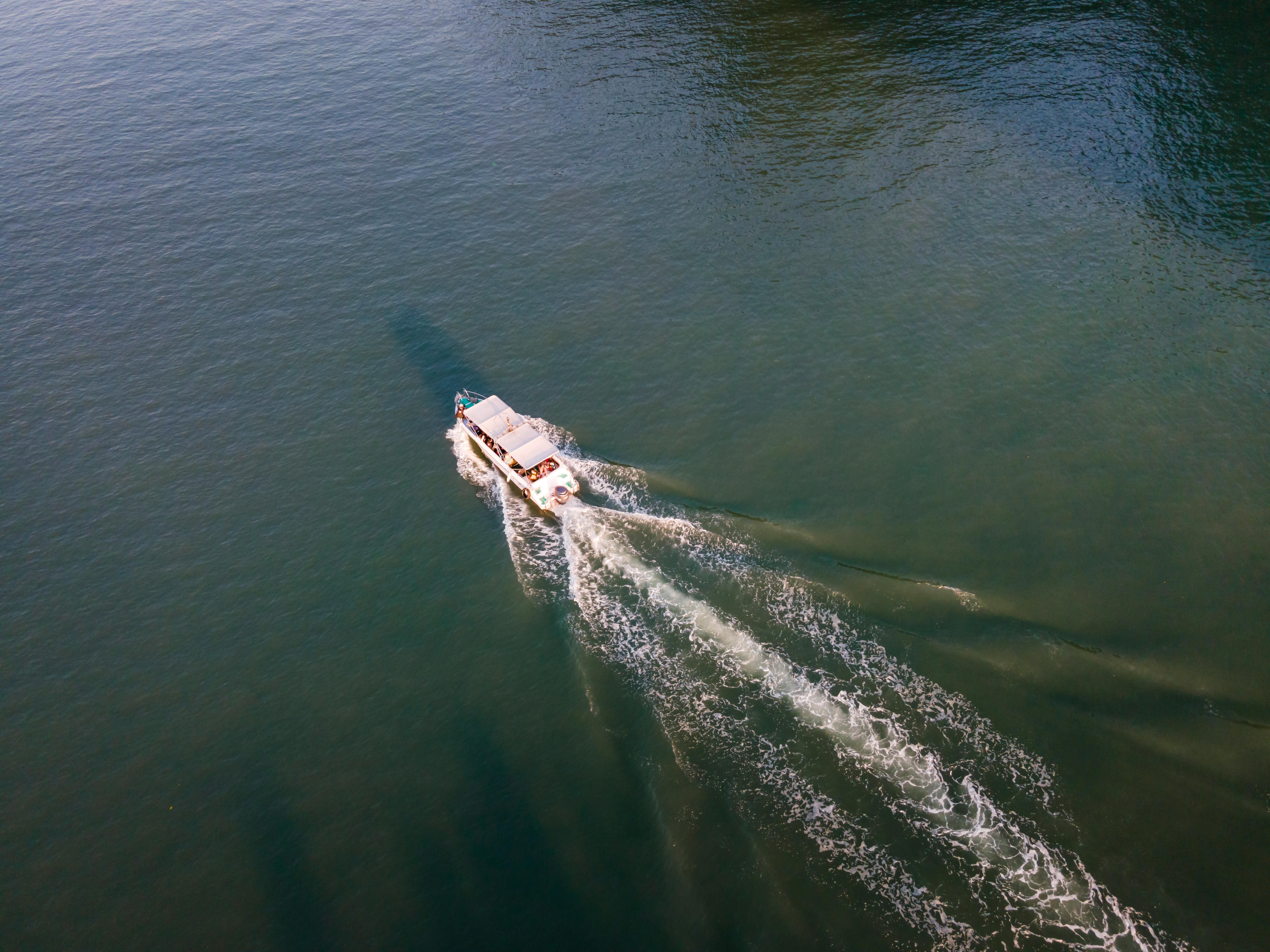 Aerial View Photo of Motor Boat on Sea · Free Stock Photo