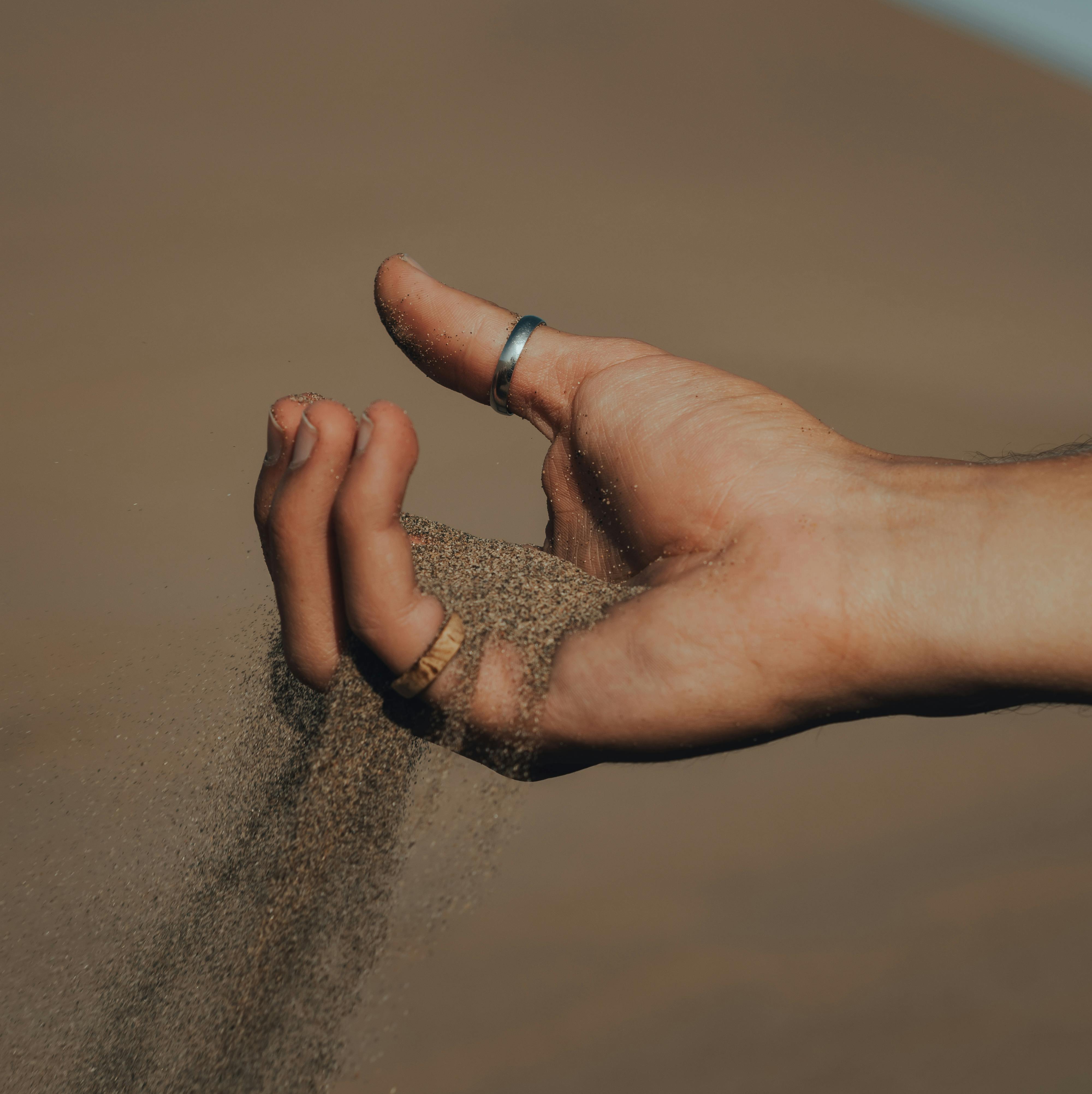 Sand Slipping Through Fingers Photos, Download The BEST Free Sand ...