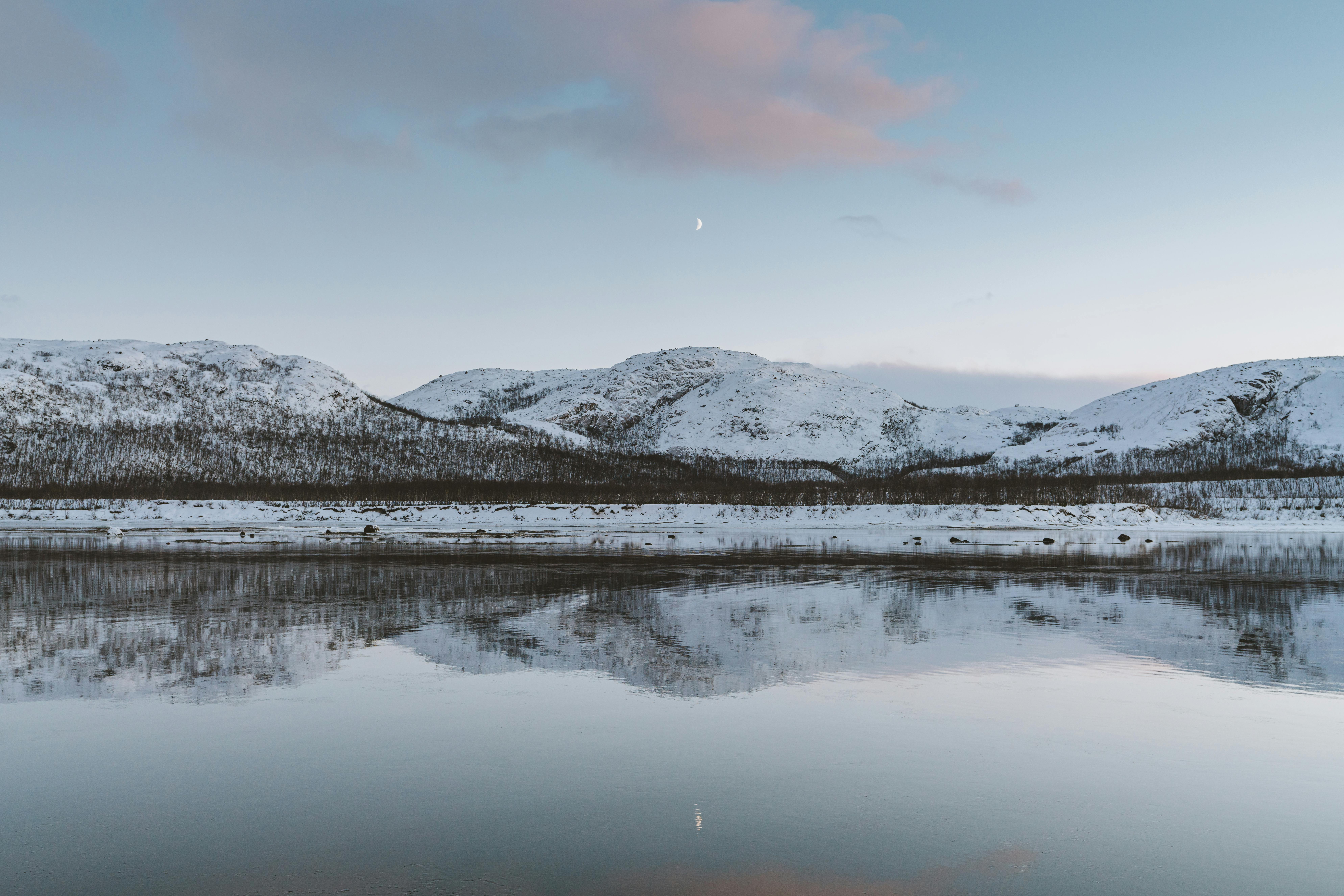 A Lake and Snow Covered Mountain · Free Stock Photo