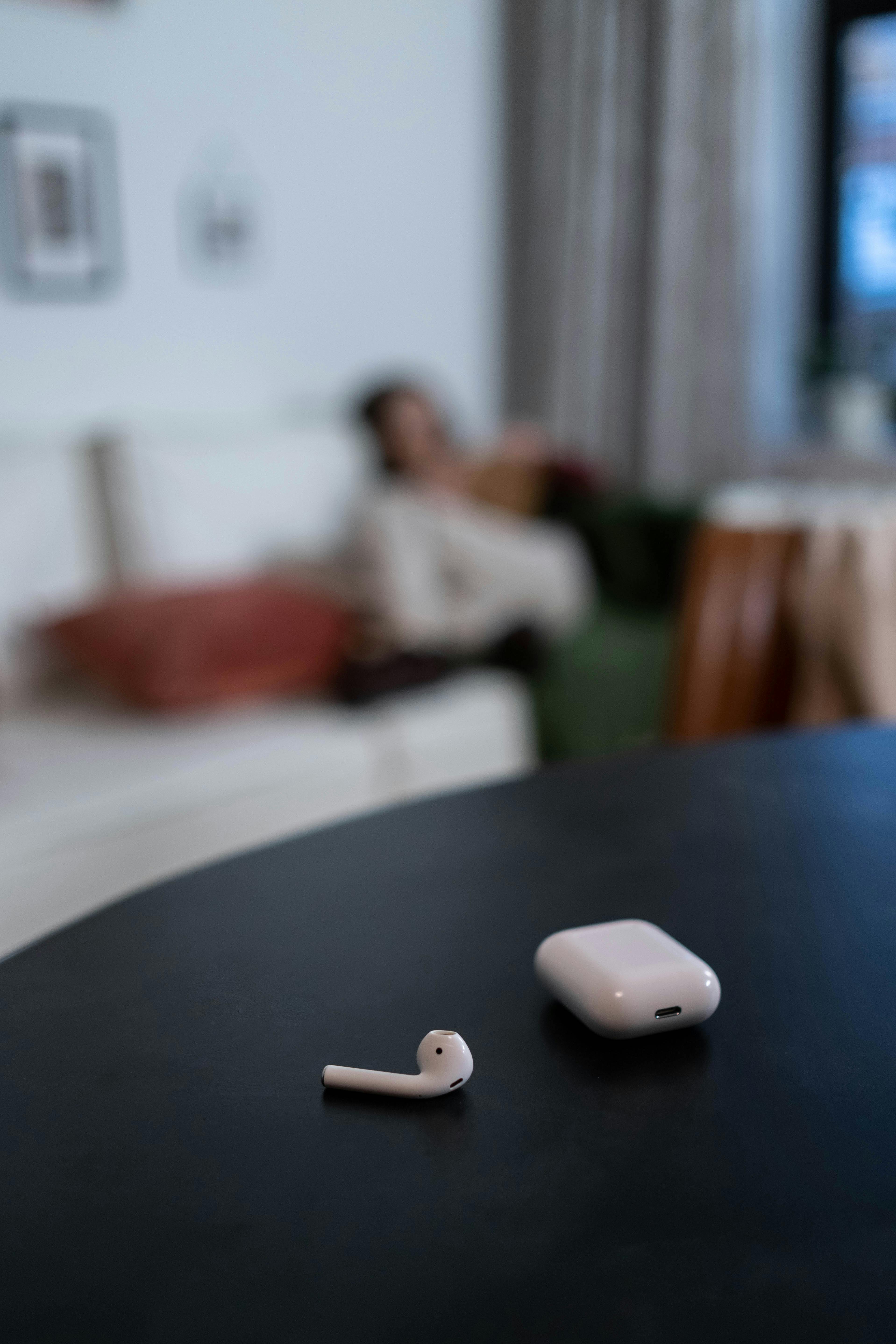 Person Holding AirPods · Free Stock Photo