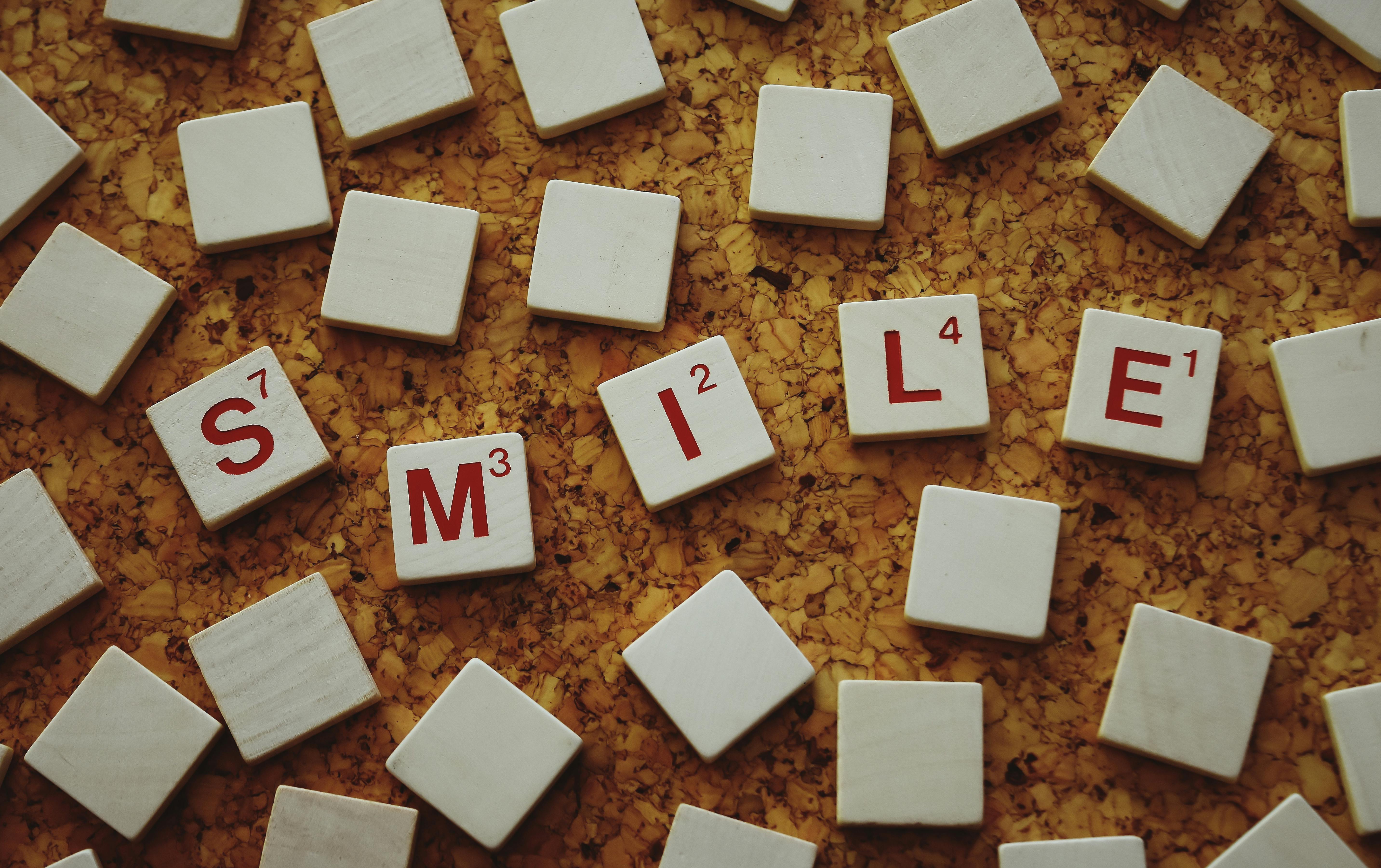 White and Red Scrabble Tiles · Free Stock Photo