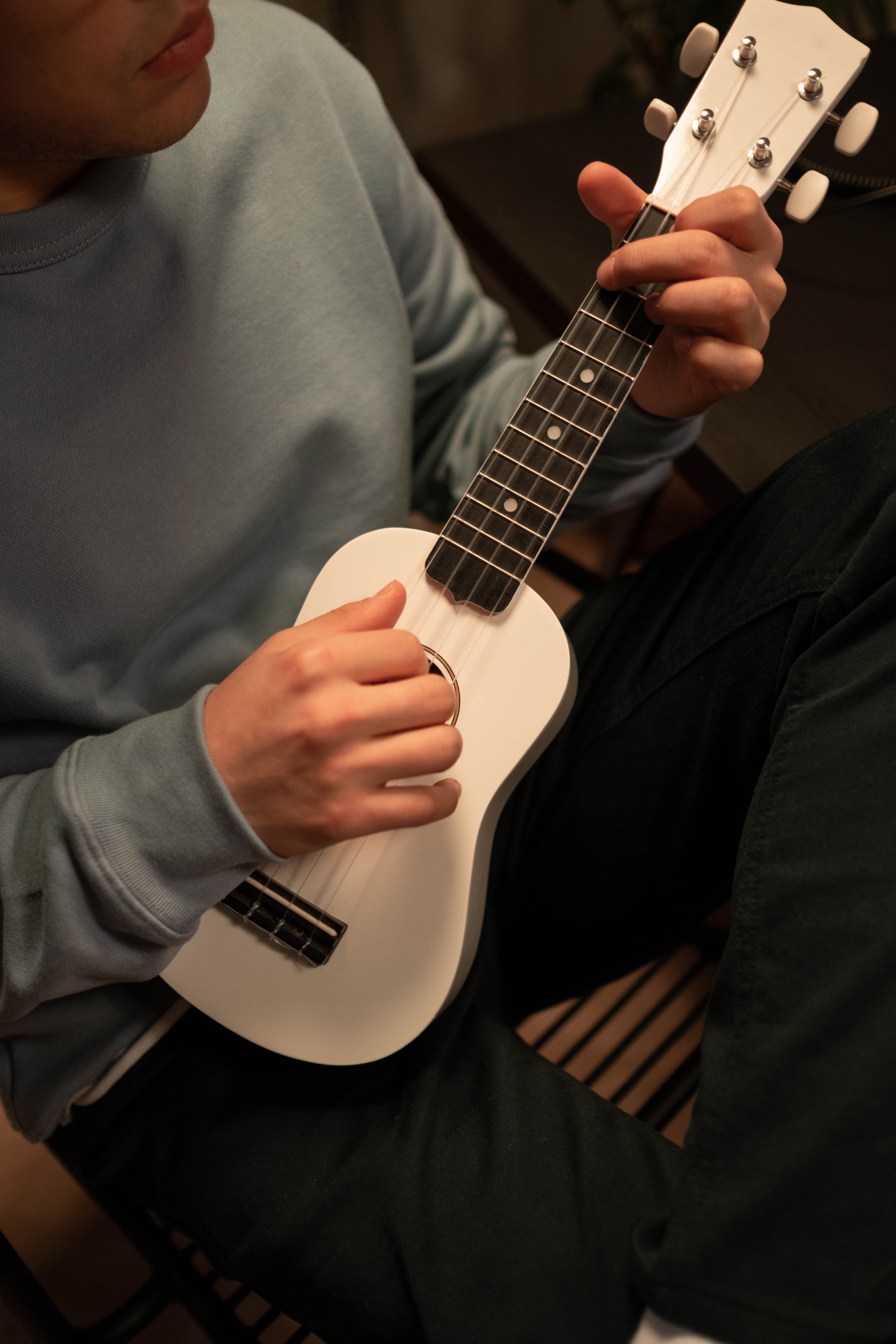 A Person Playing Ukulele · Free Stock Photo