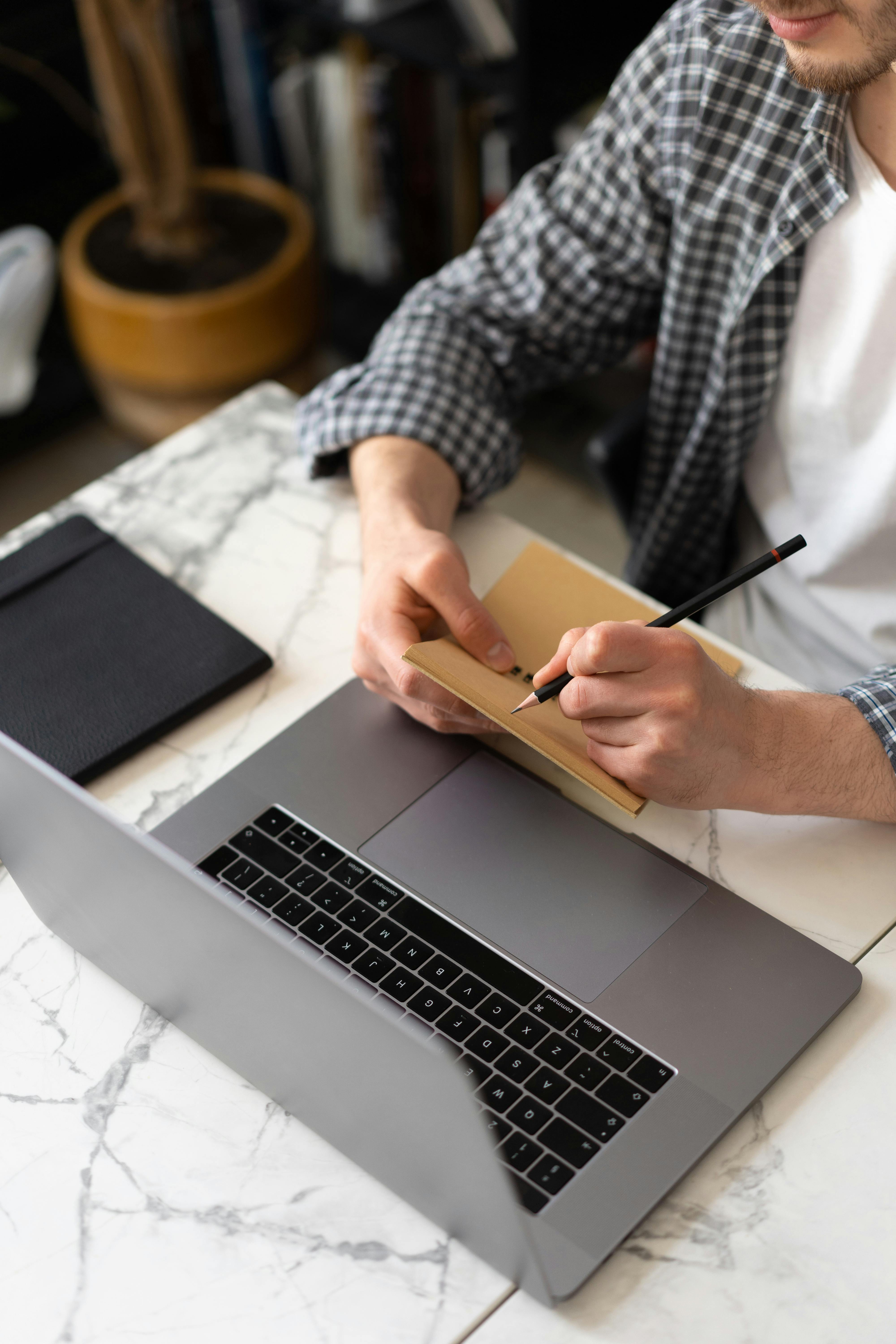 A Person Taking Notes · Free Stock Photo