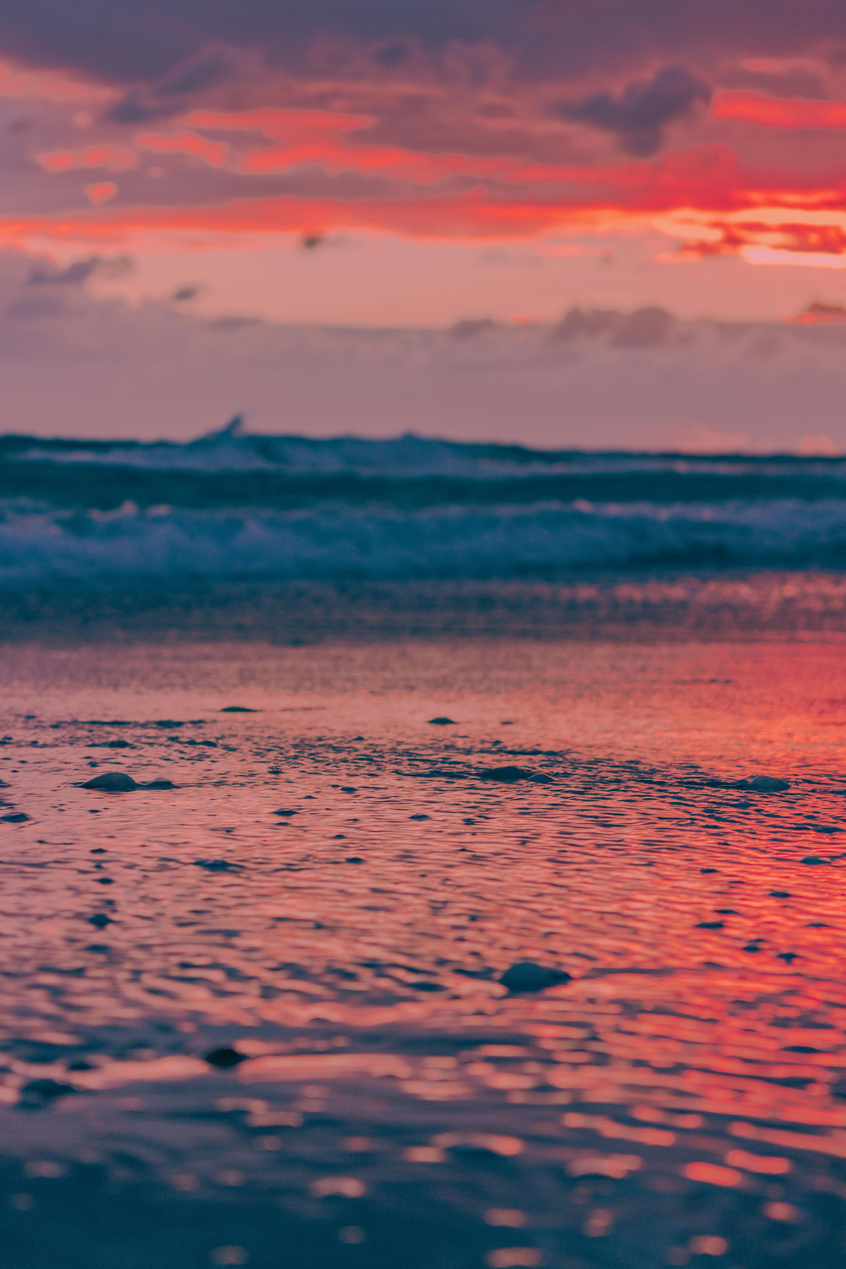 A Hand on the Water During Sunset · Free Stock Photo