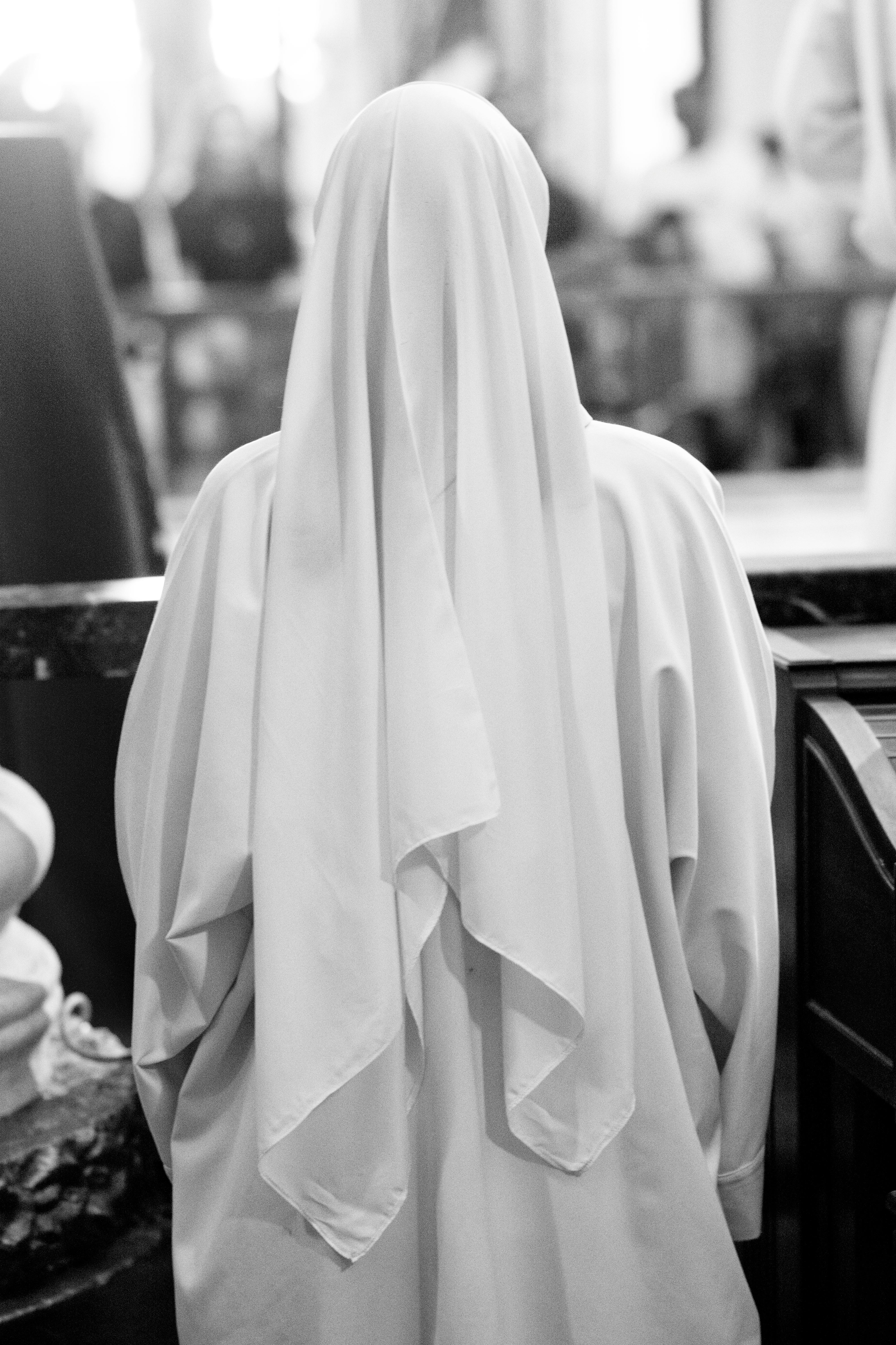 Back View of a Nun Standing · Free Stock Photo