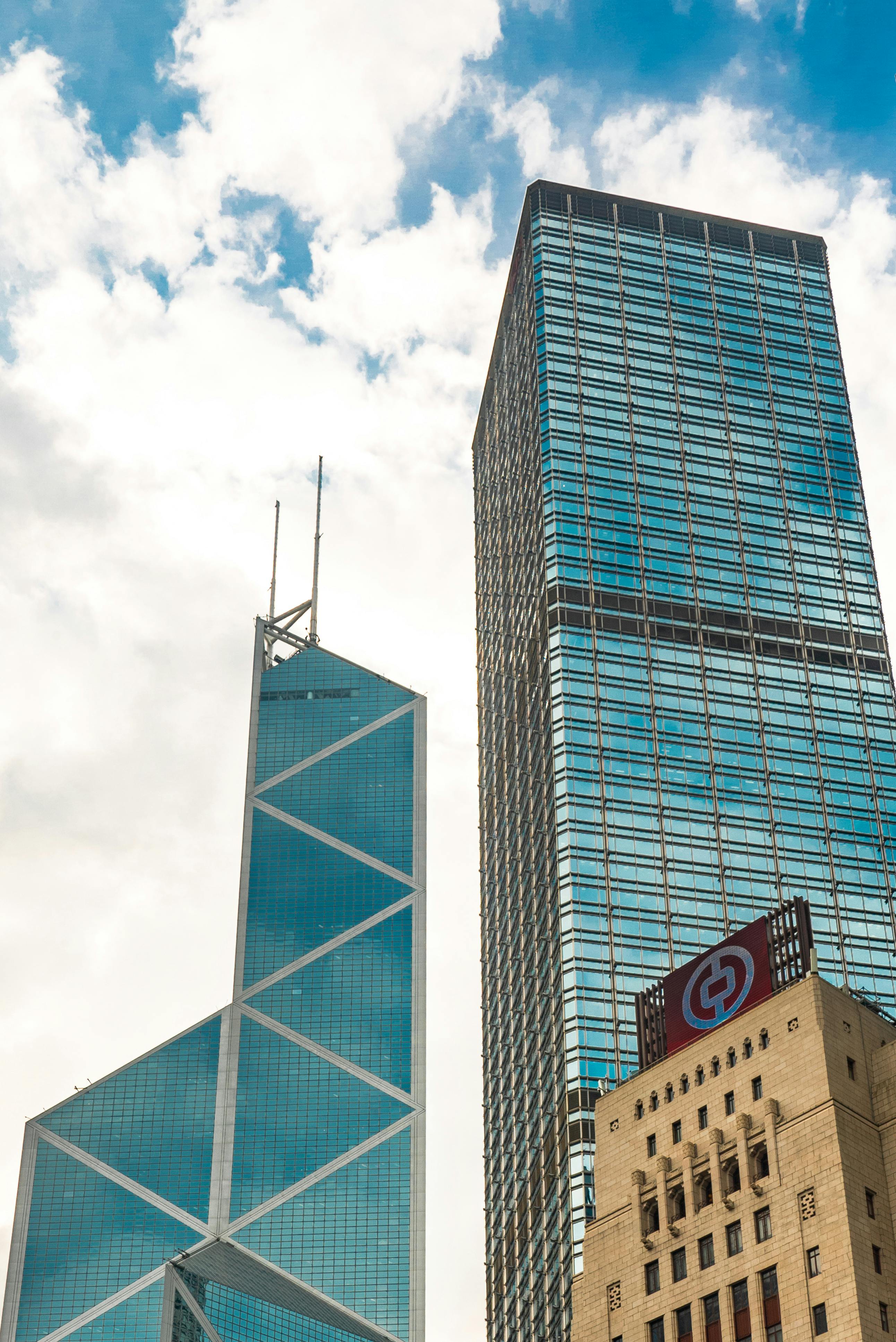 High Rise Buildings Under Cloudy Sky · Free Stock Photo