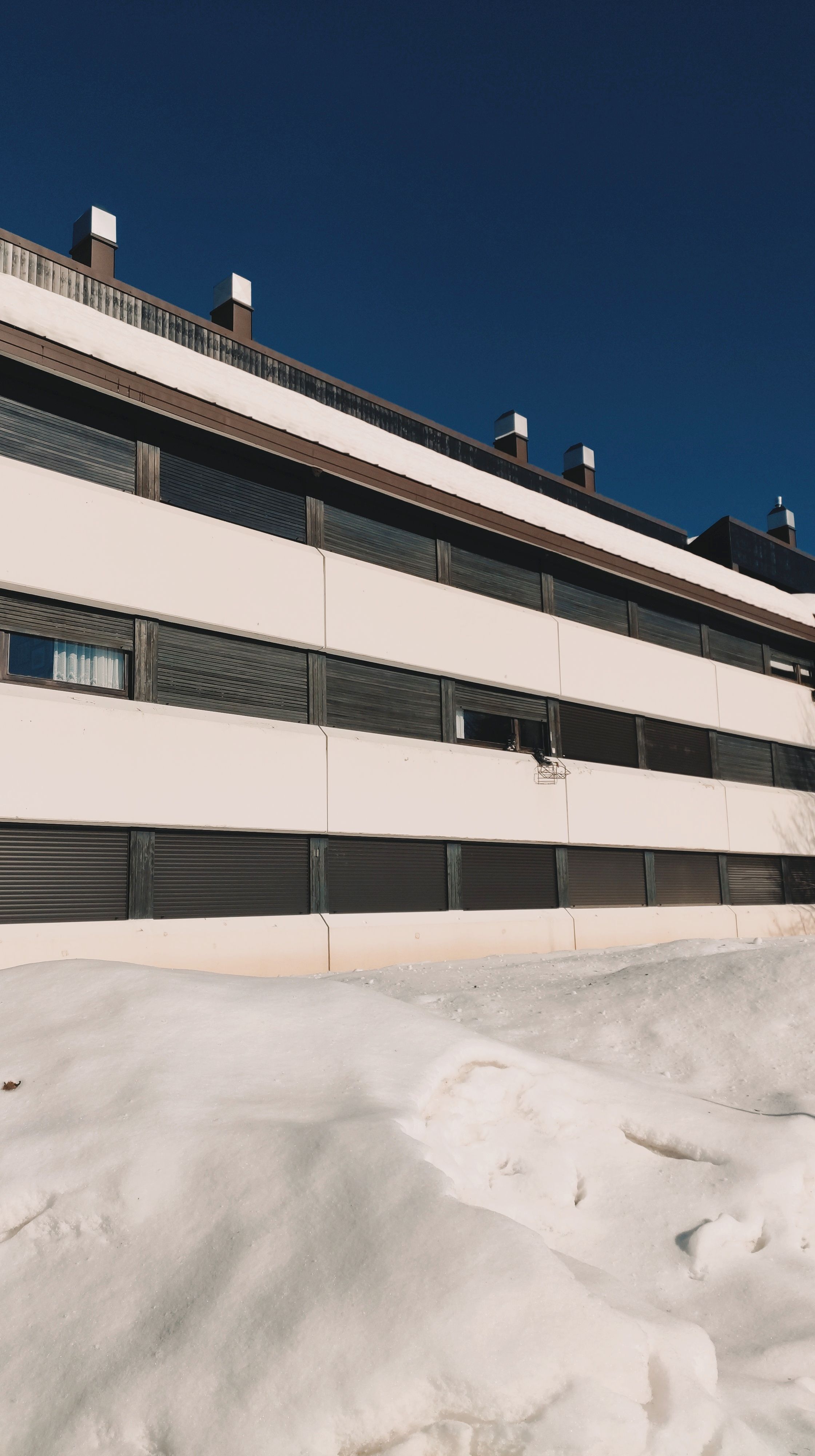 White Building Surrounded with Snow · Free Stock Photo