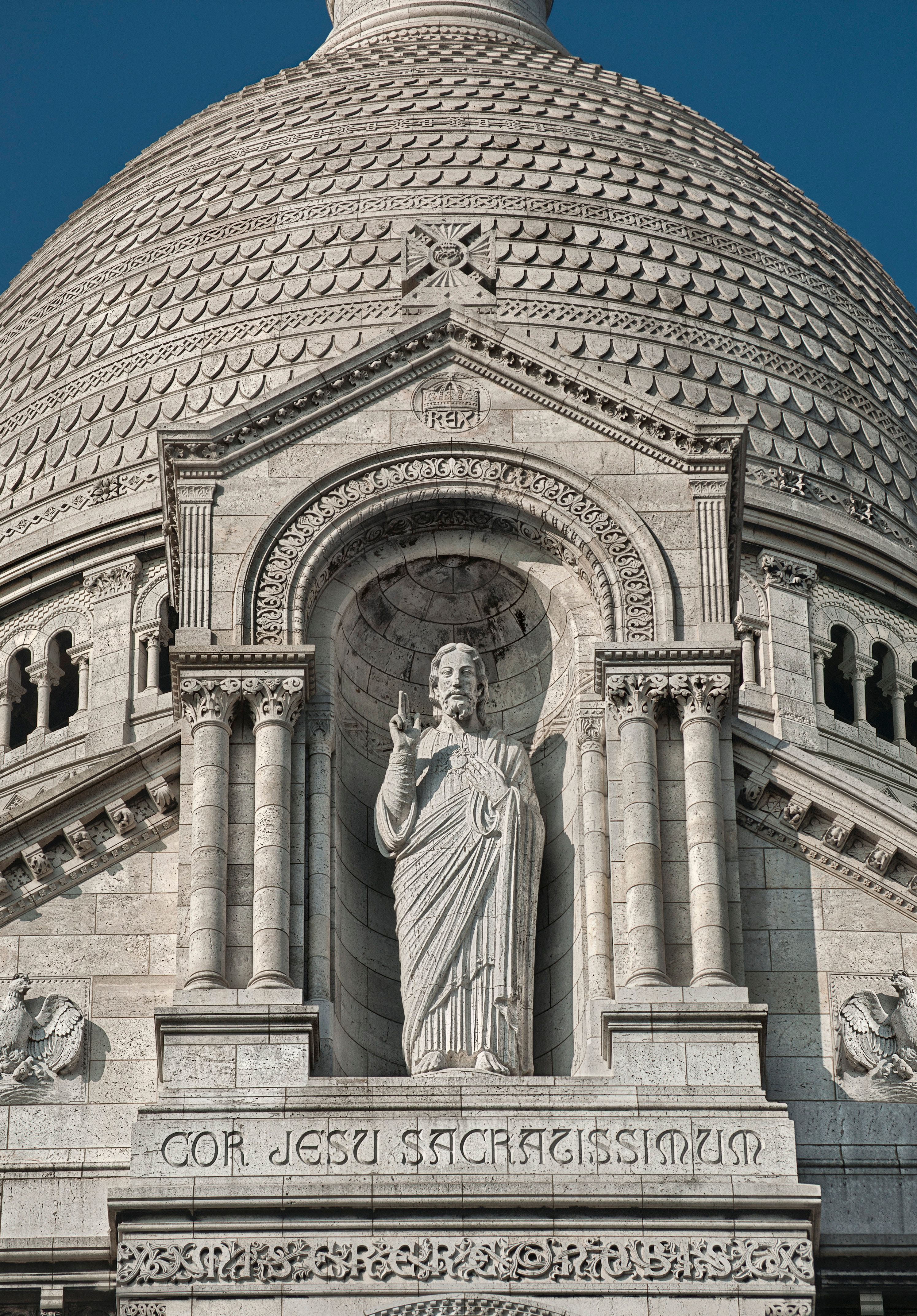 Symmetrical View of Gray Stone Church Cupola with Christ Sculpture ...