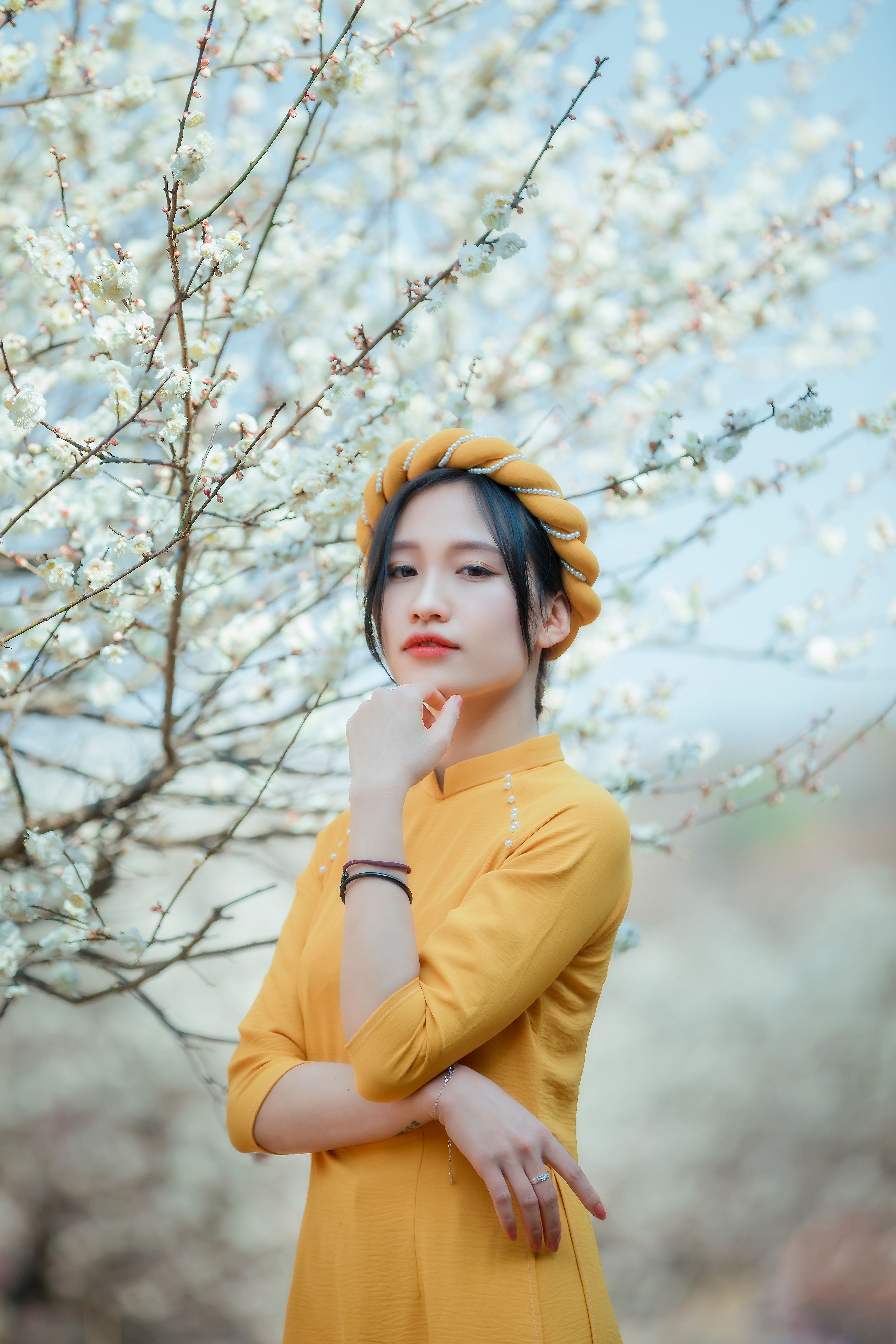 Beautiful Woman on the Background of a Cherry Blossom · Free Stock Photo