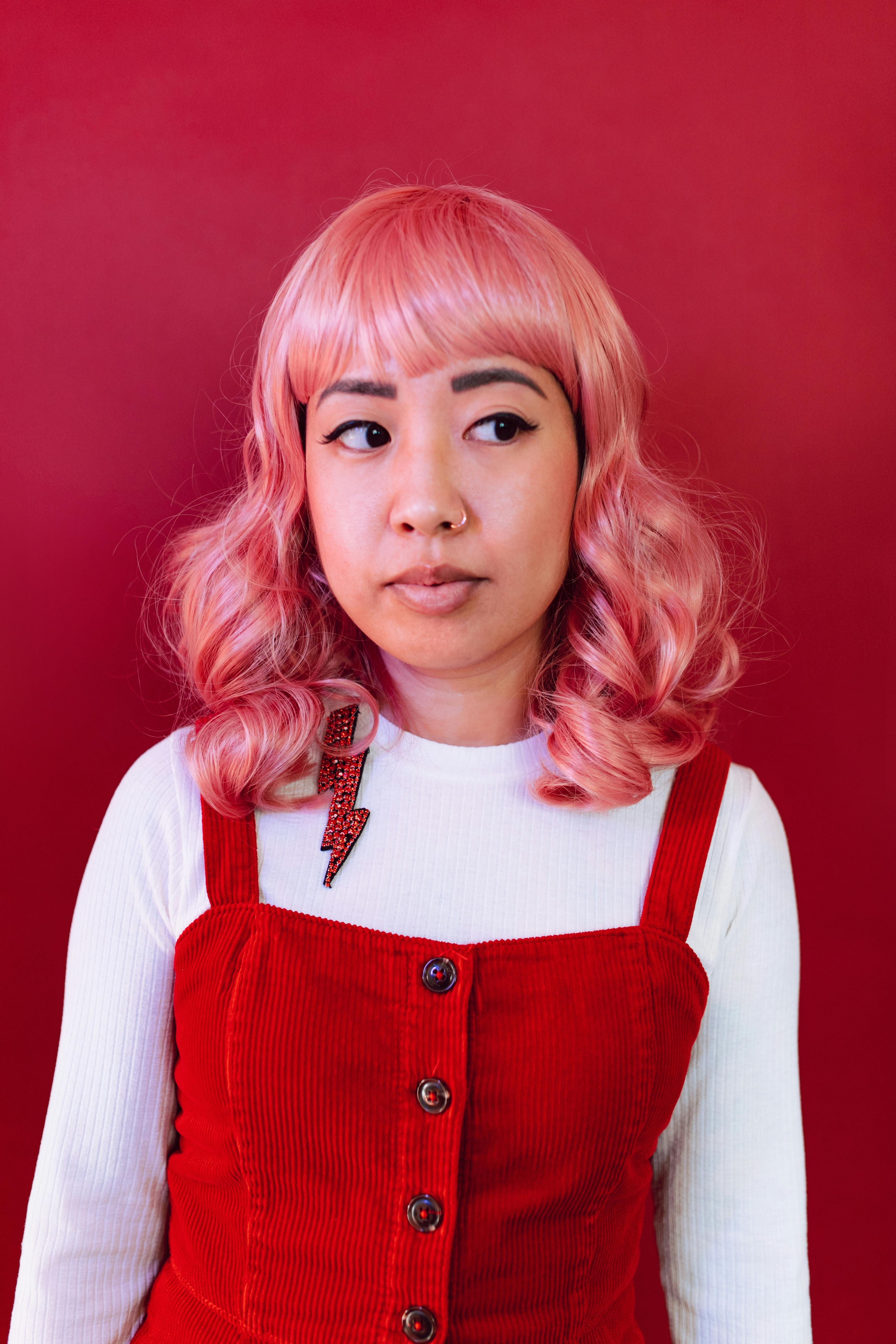 Woman in Red Overalls · Free Stock Photo