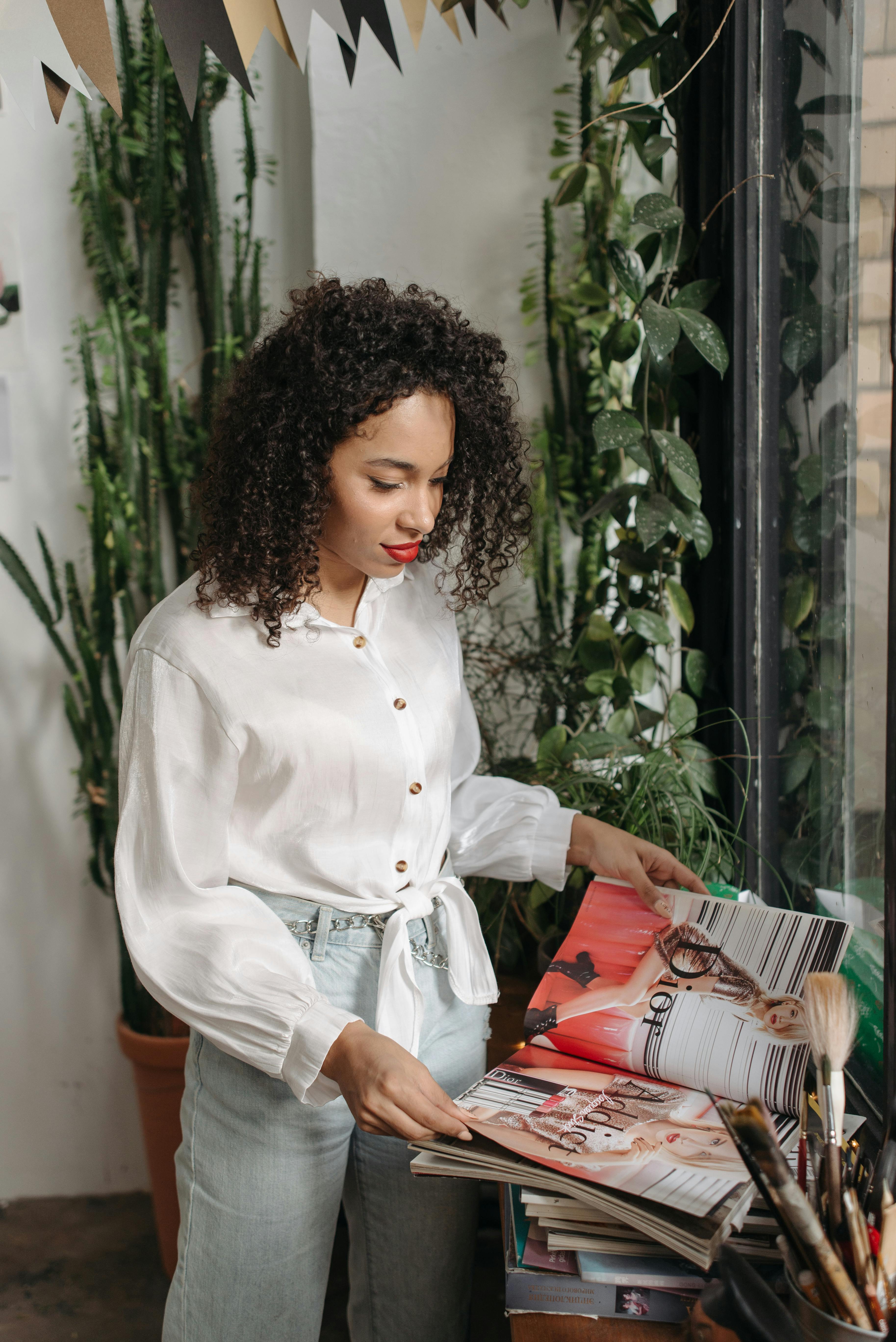 A Woman Reading a Magazine · Free Stock Photo