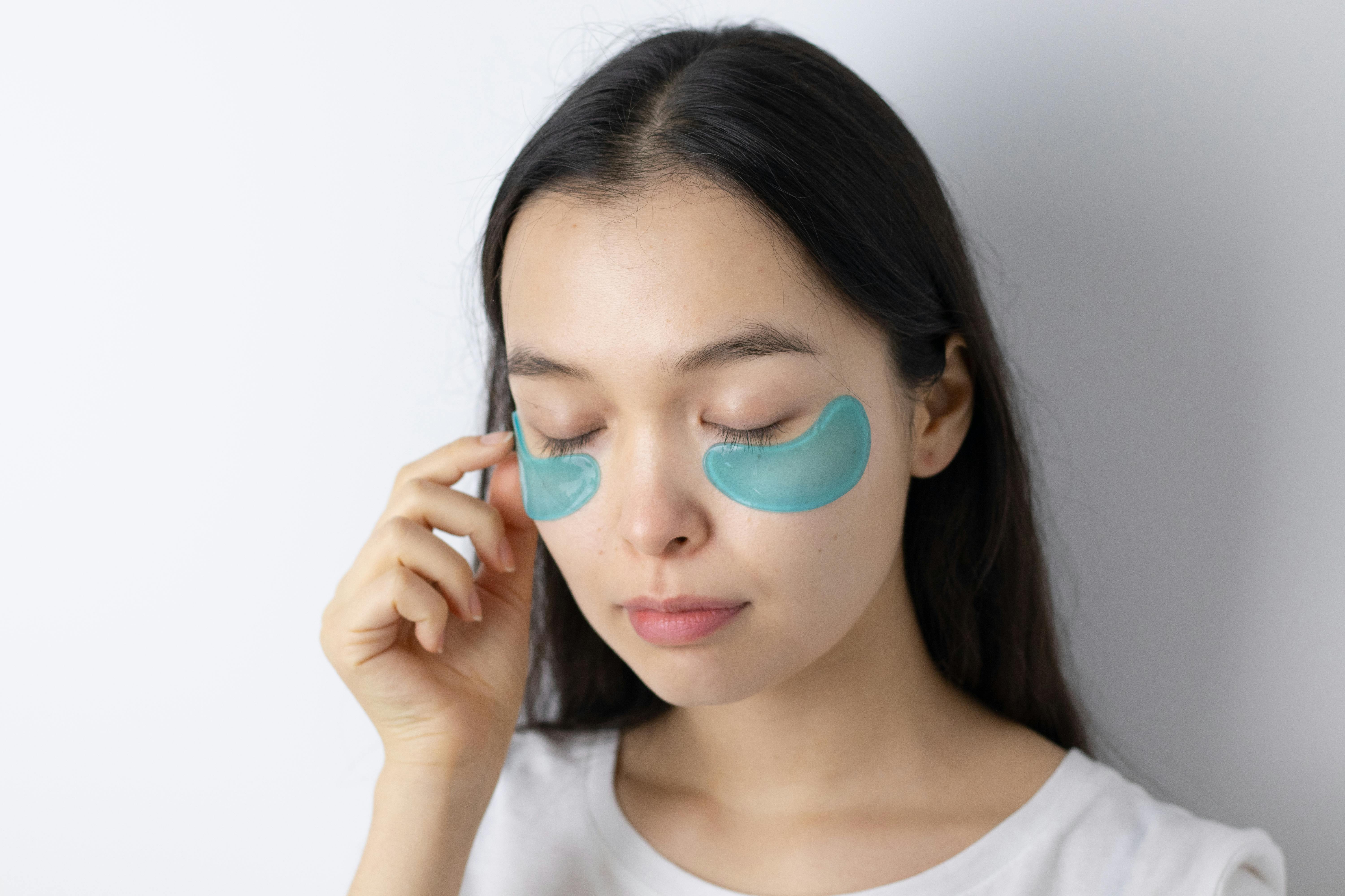 Woman with Blue Under-Eye Patches · Free Stock Photo