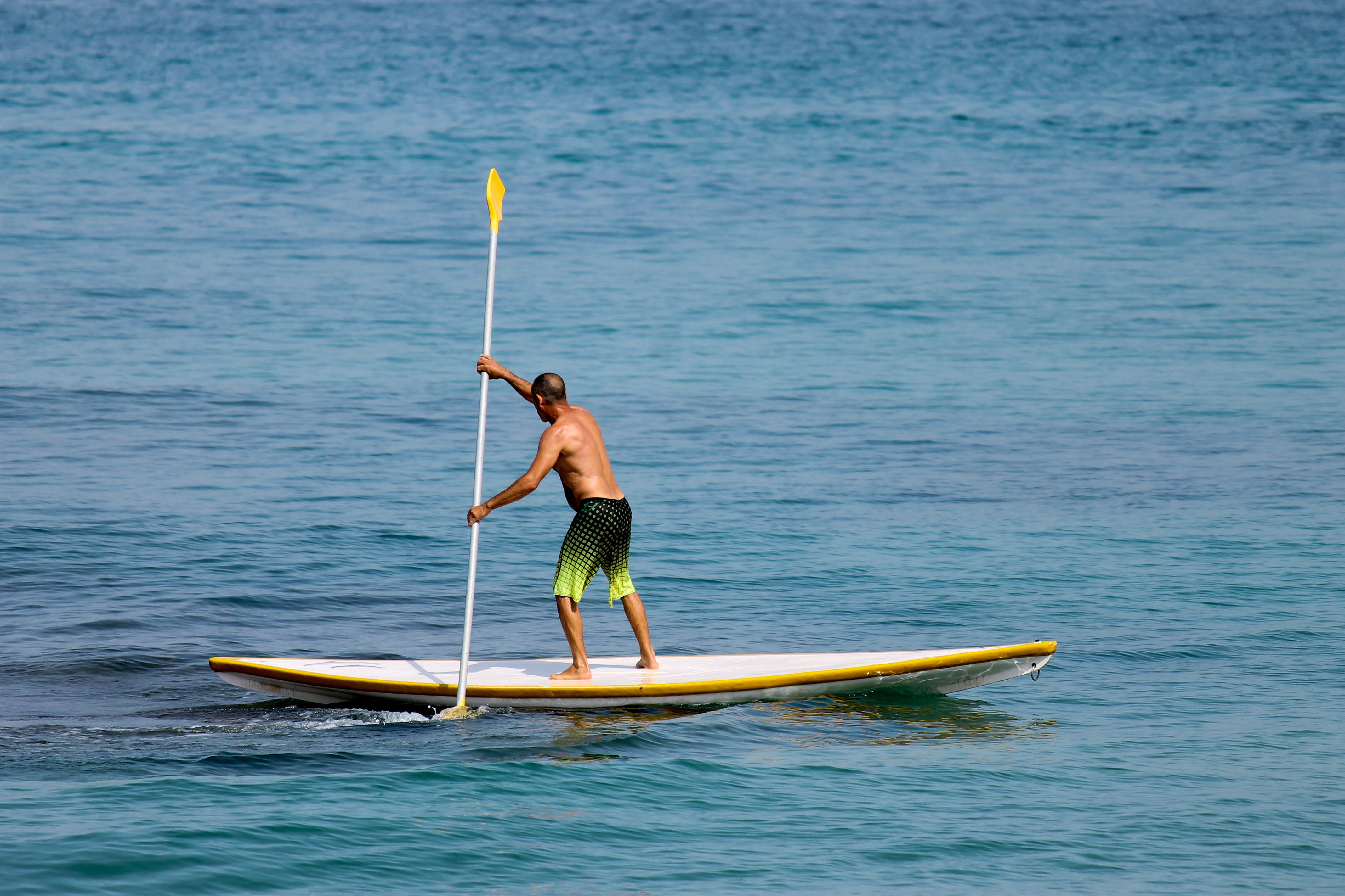 A Woman on a Paddleboard · Free Stock Photo