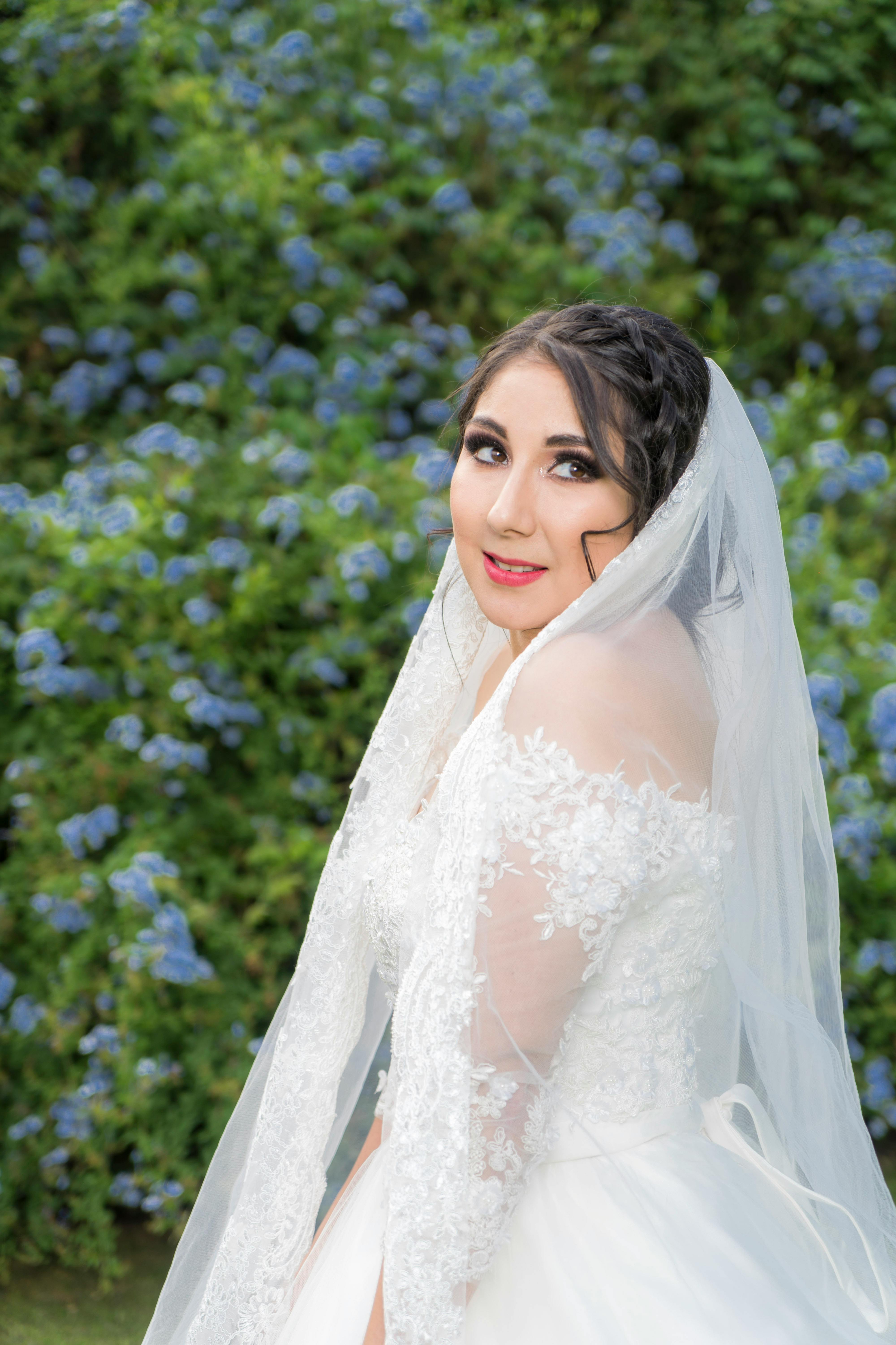 Photo of a Standing Bride Wearing Wedding Dress · Free Stock Photo