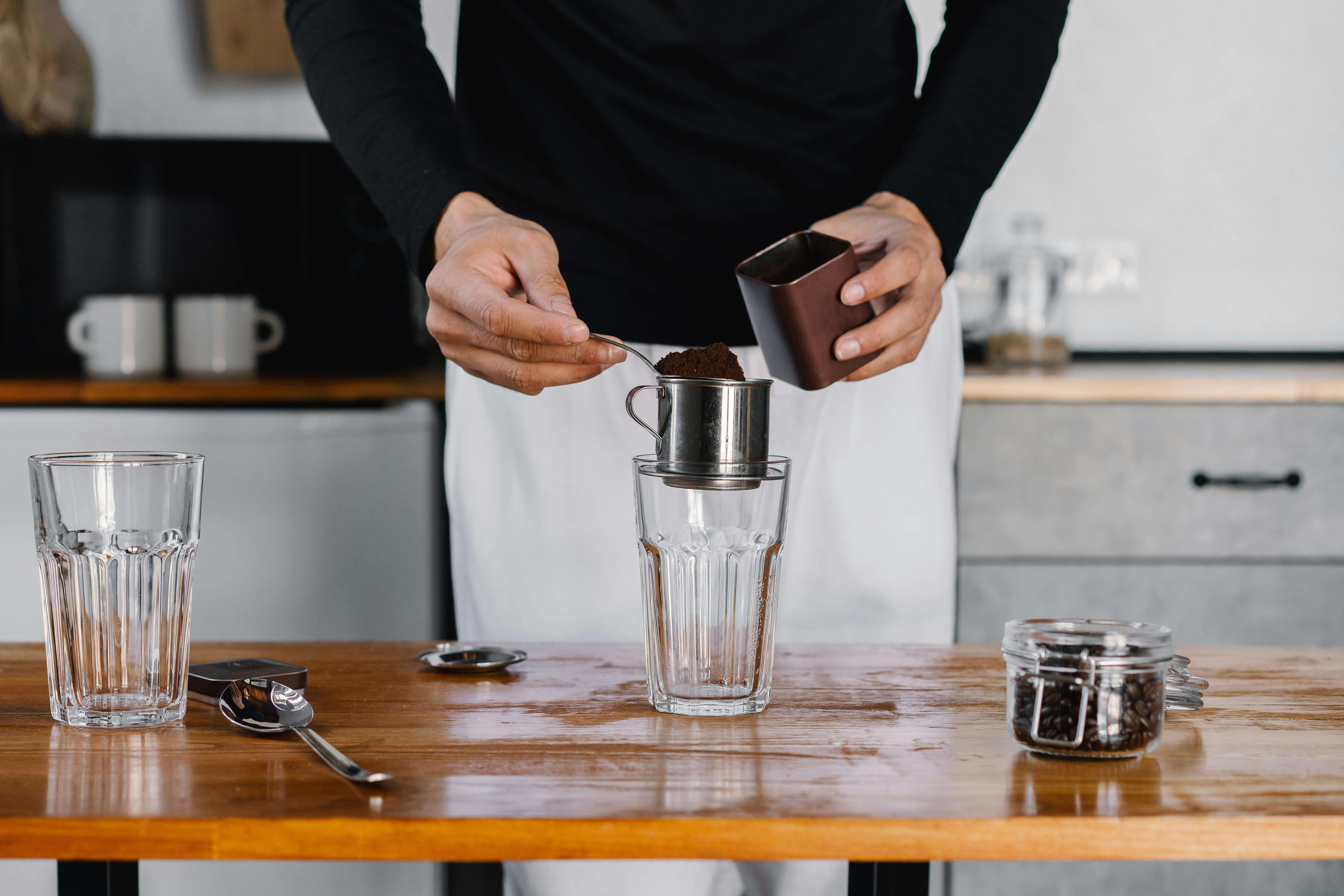 Close-up Photo of Person making Coffee · Free Stock Photo