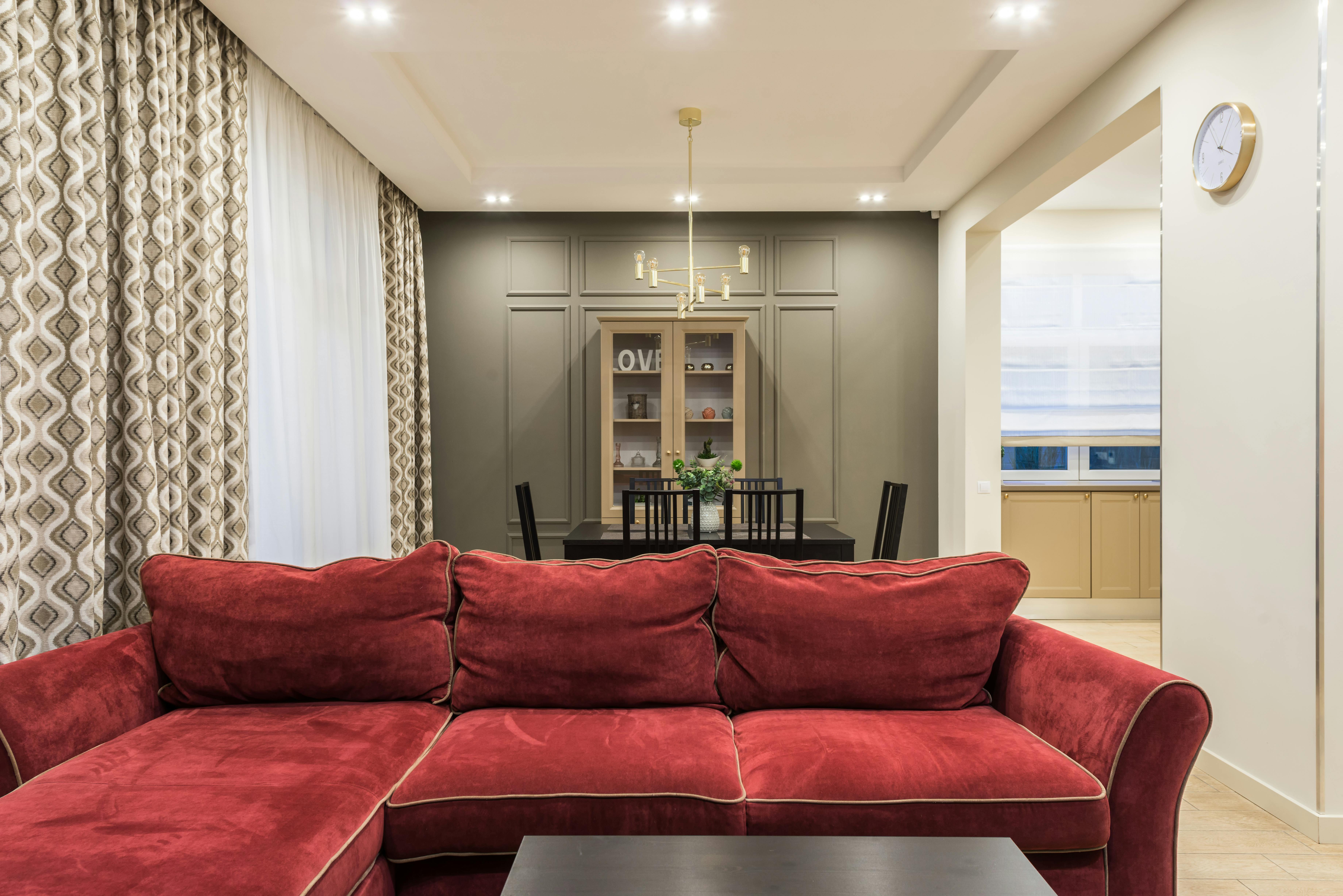 Modern interior of lounge with soft red sofa · Free Stock Photo