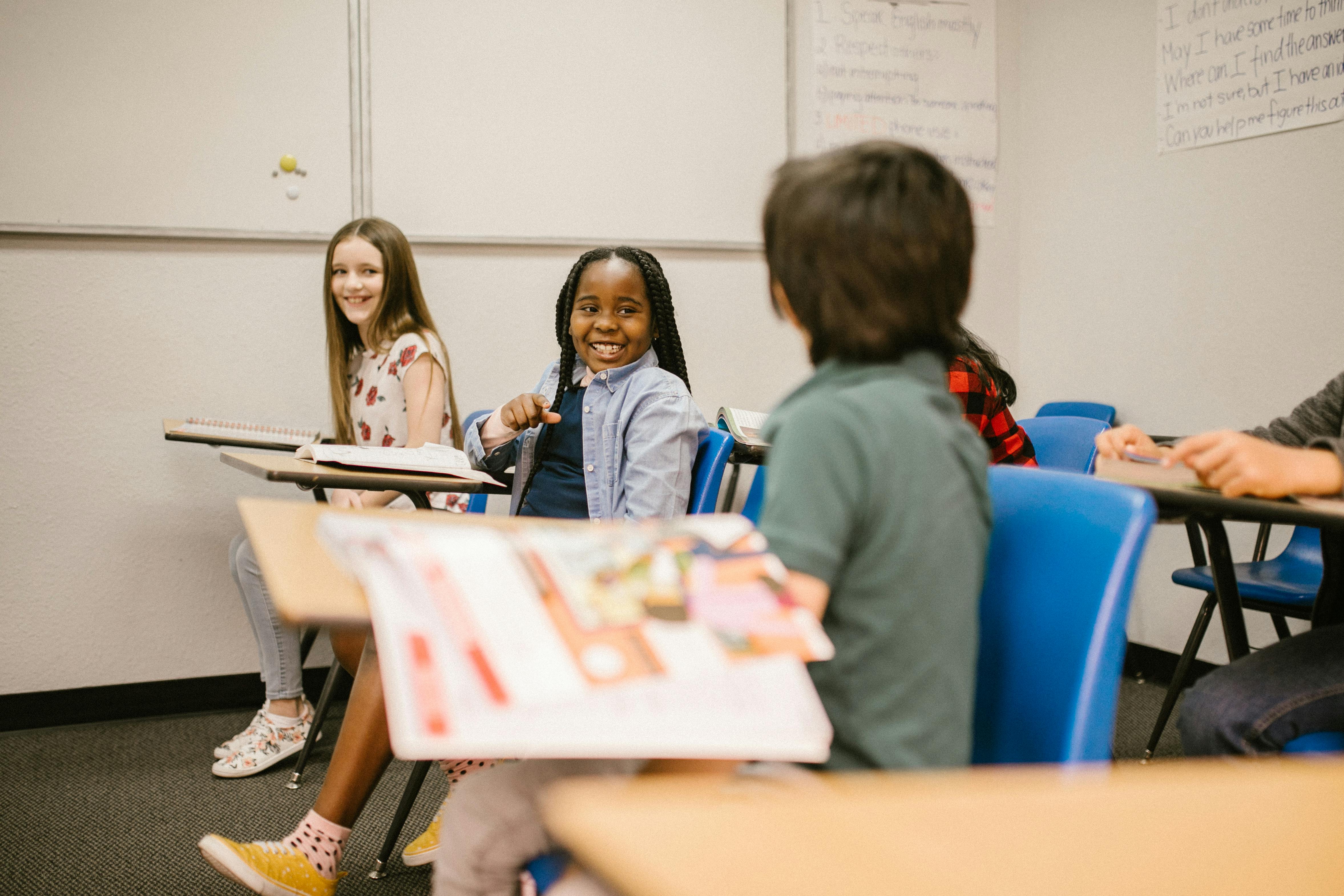Students Laughing Inside the Classroom · Free Stock Photo