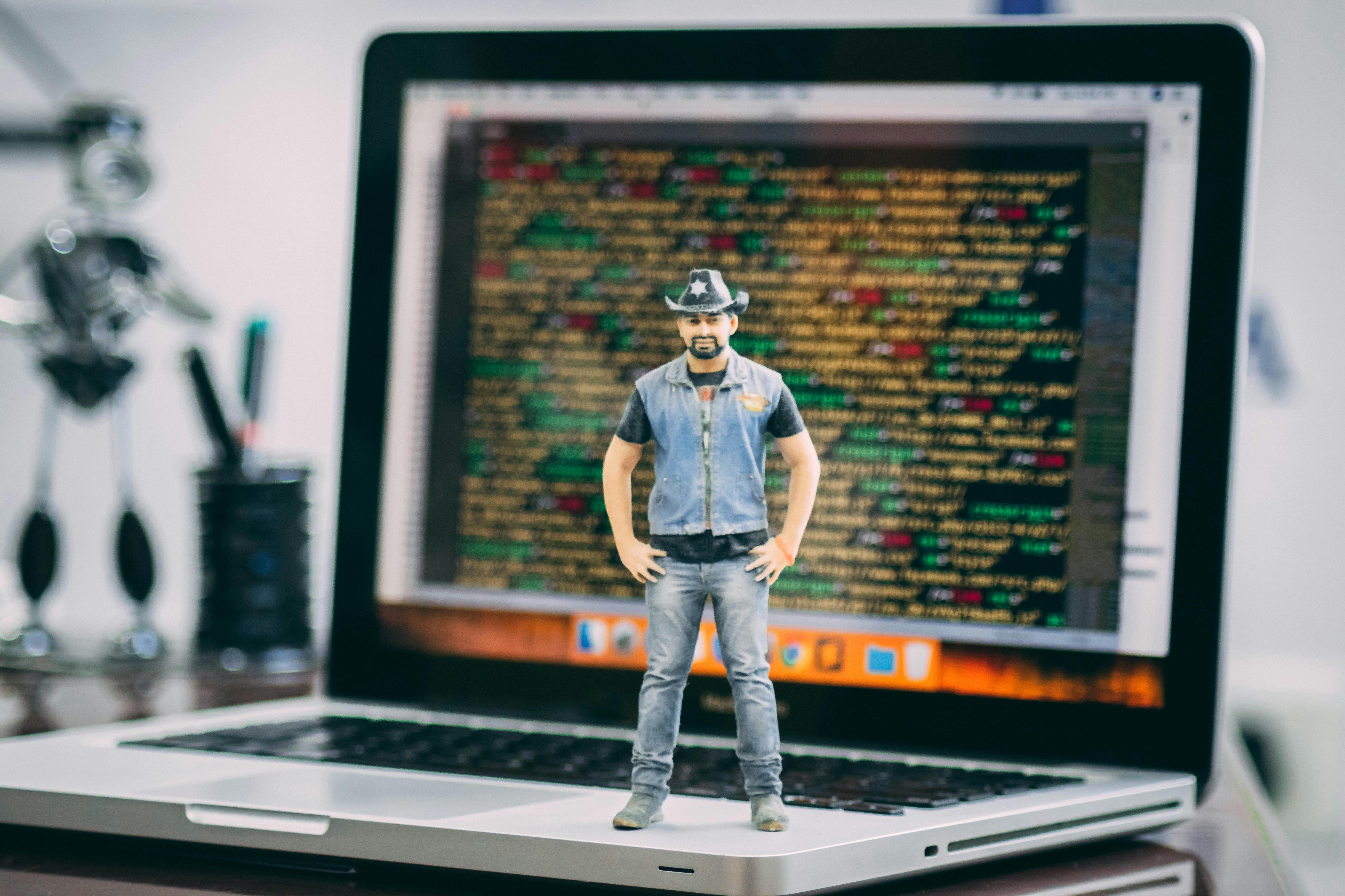 Selective Focus Photography of Man Facing Computer · Free Stock Photo
