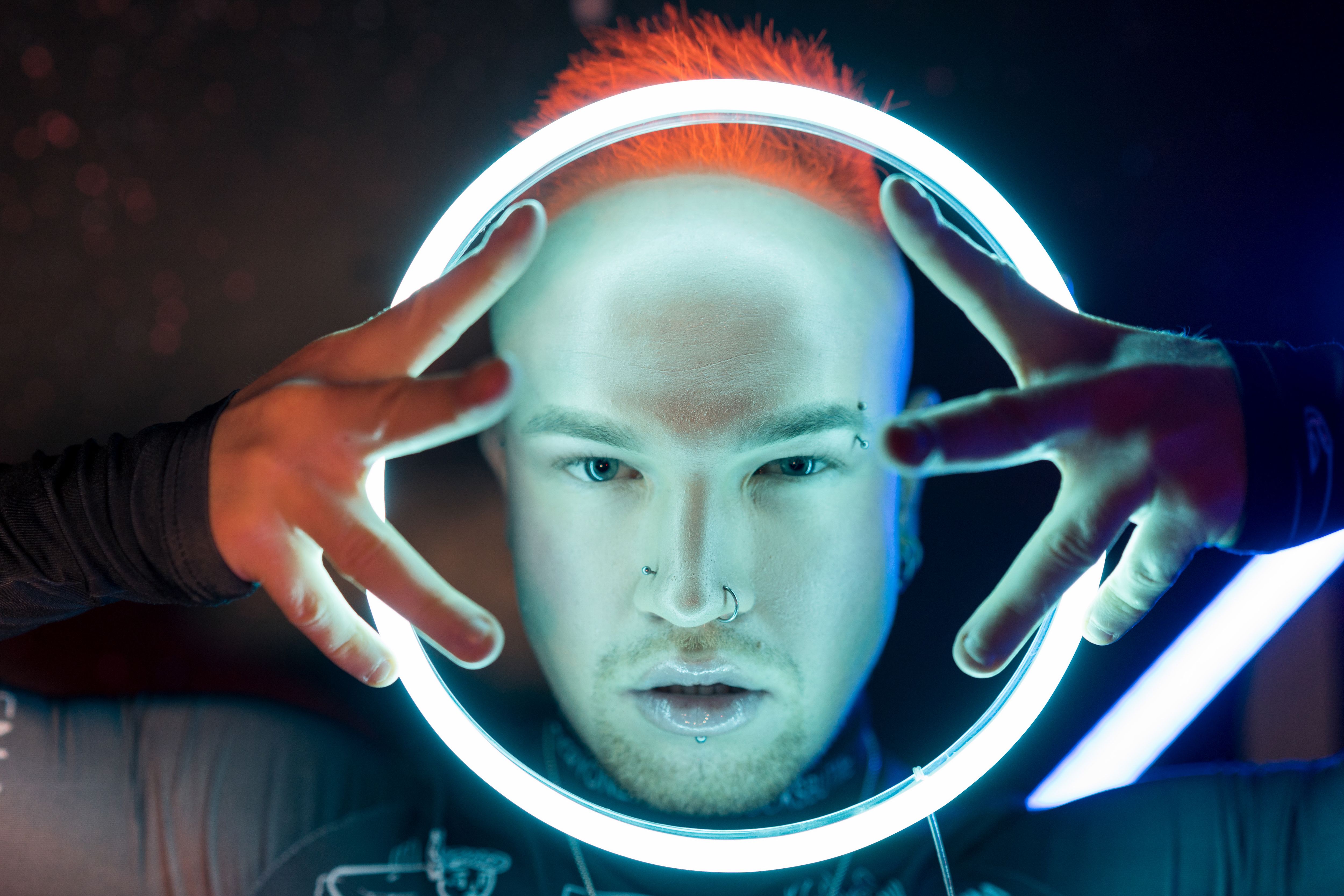 Man Holding a Ring Light · Free Stock Photo